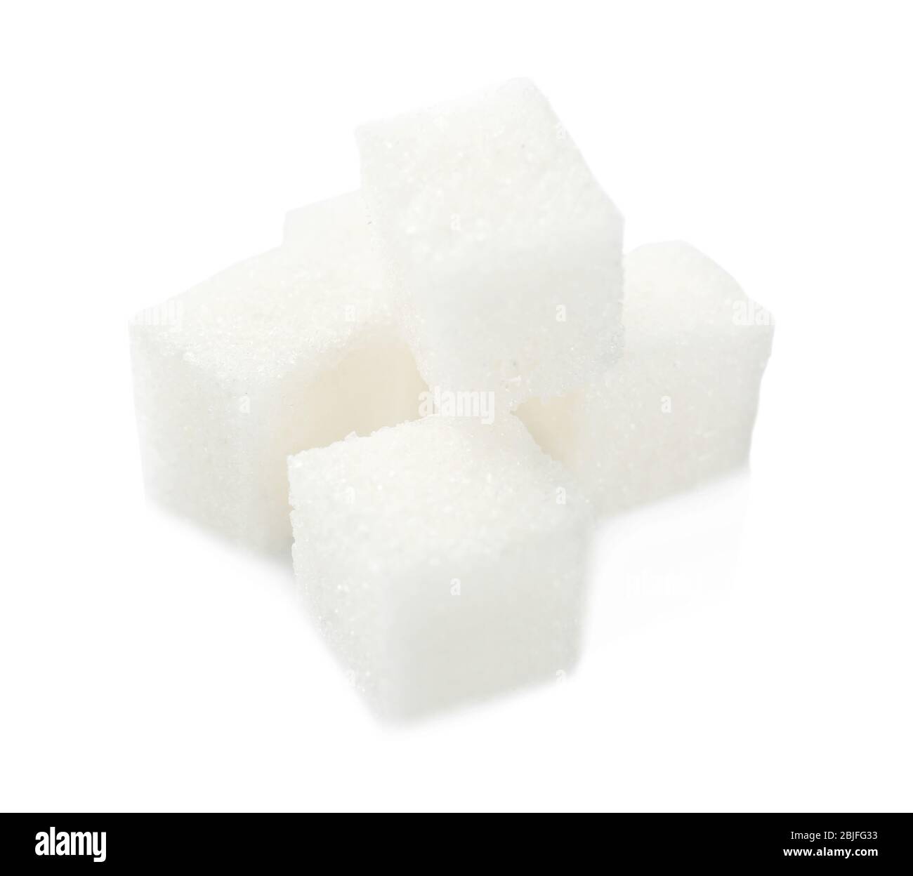Sugar cubes on white background Stock Photo - Alamy
