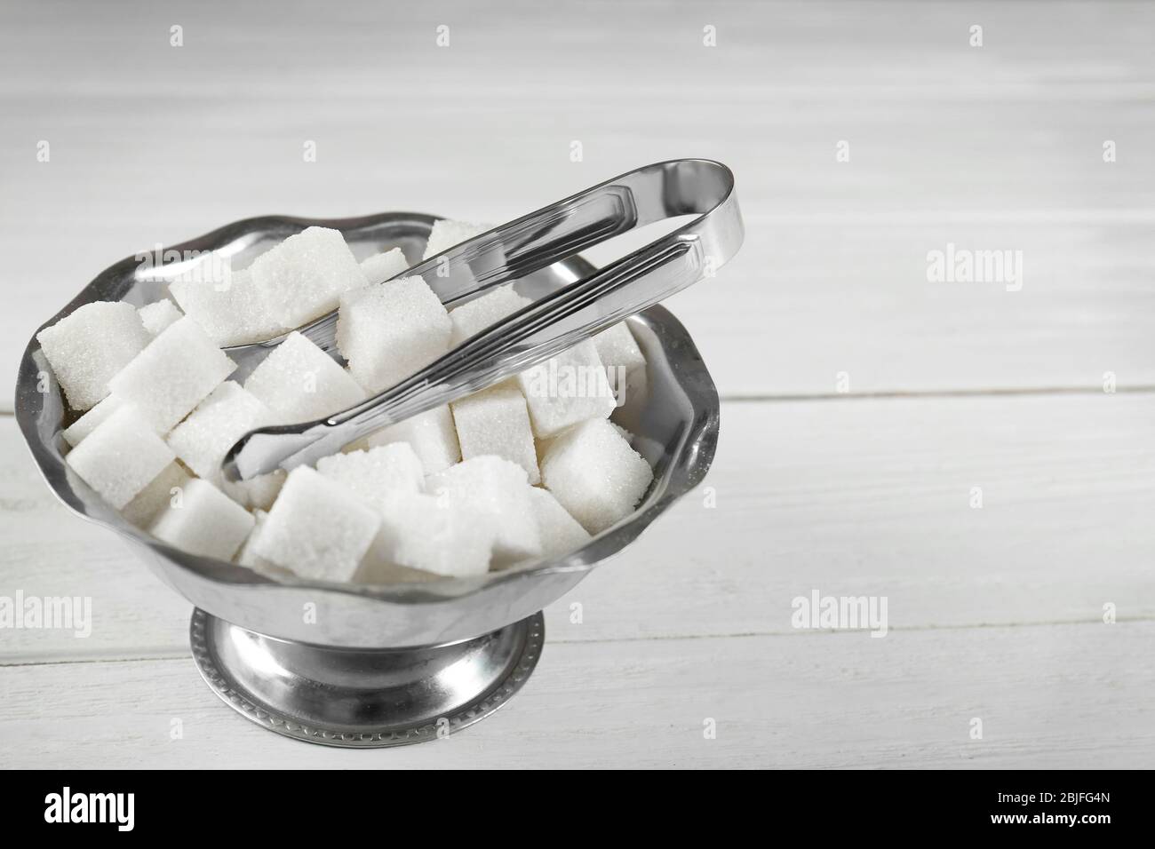 Metal bowl sugar cubes hi-res stock photography and images - Alamy