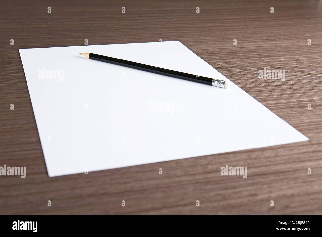 Empty paper sheet with pencil on table. Job interview concept Stock ...