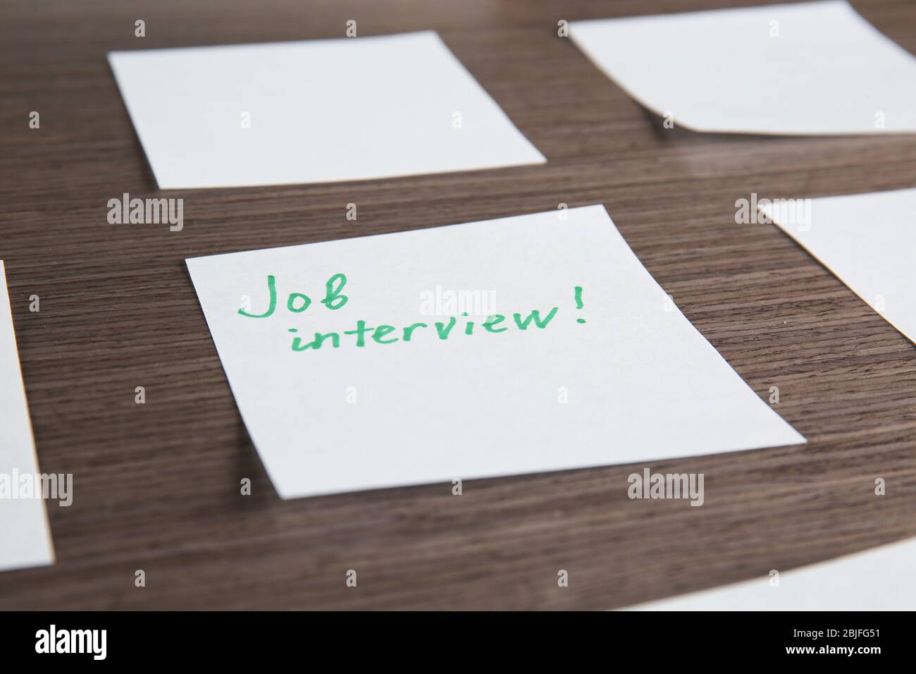 Paper sheets on table. Job interview concept Stock Photo - Alamy