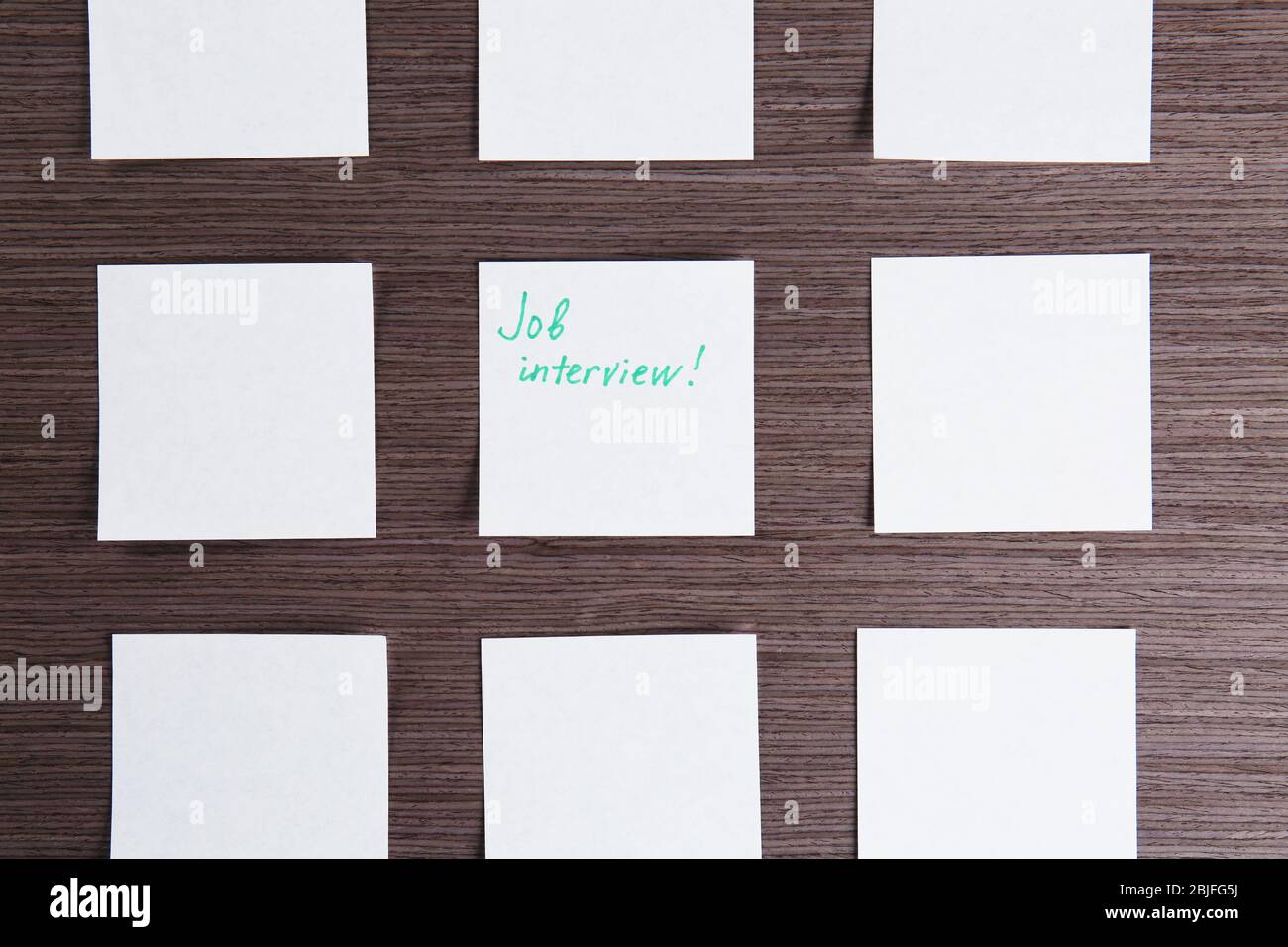 Paper sheets on table. Job interview concept Stock Photo - Alamy