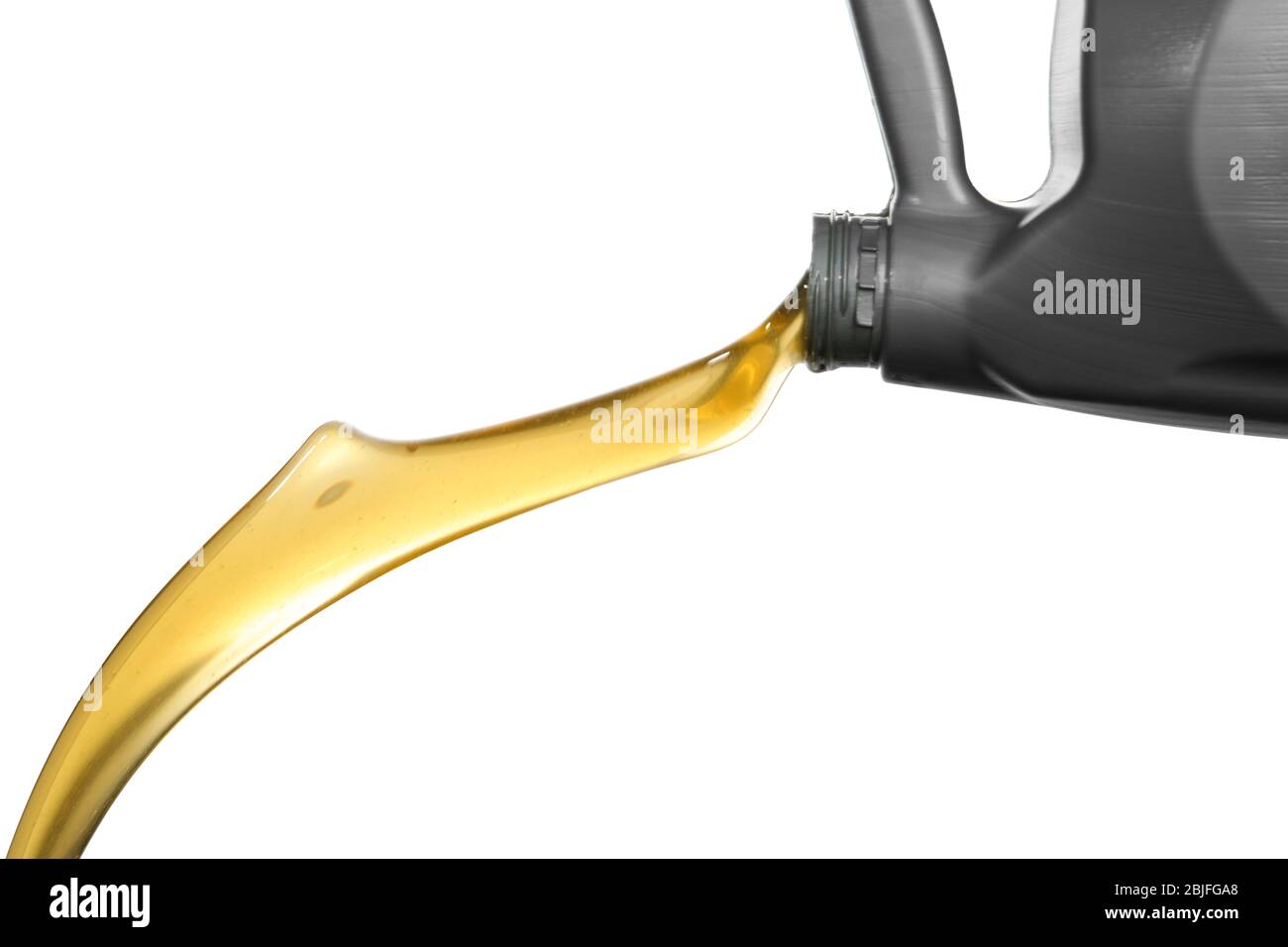 Engine oil pouring from canister, isolated on white Stock Photo - Alamy
