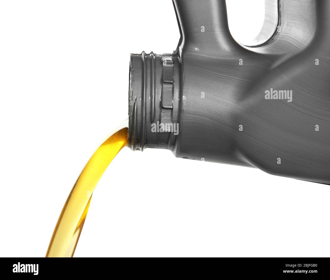 Engine oil pouring from canister, isolated on white Stock Photo - Alamy