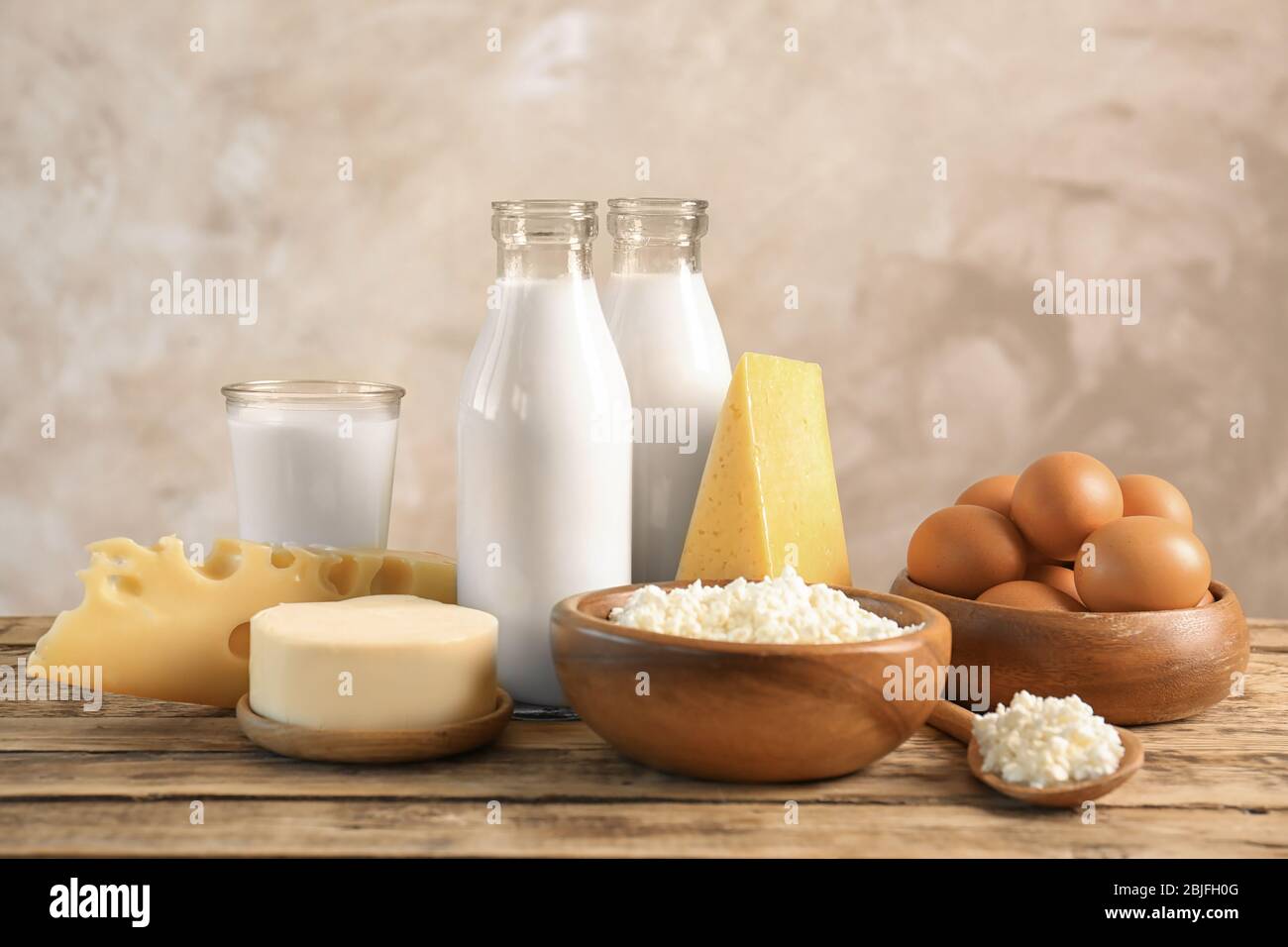 Set of different dairy products on table Stock Photo - Alamy