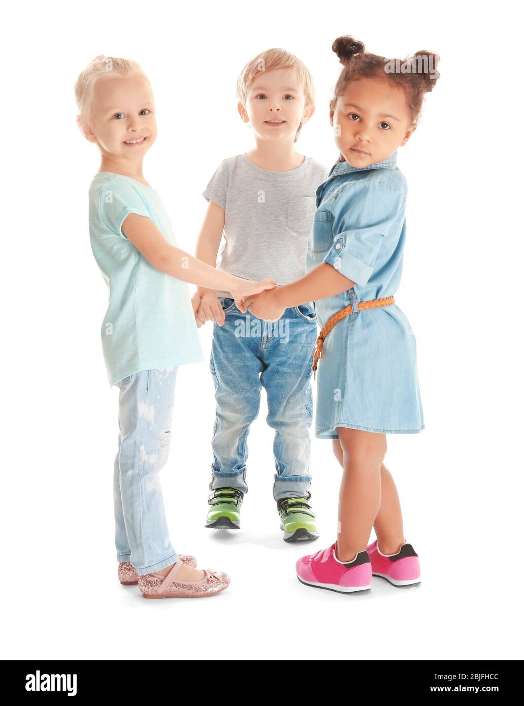 Cute little children on white background Stock Photo - Alamy