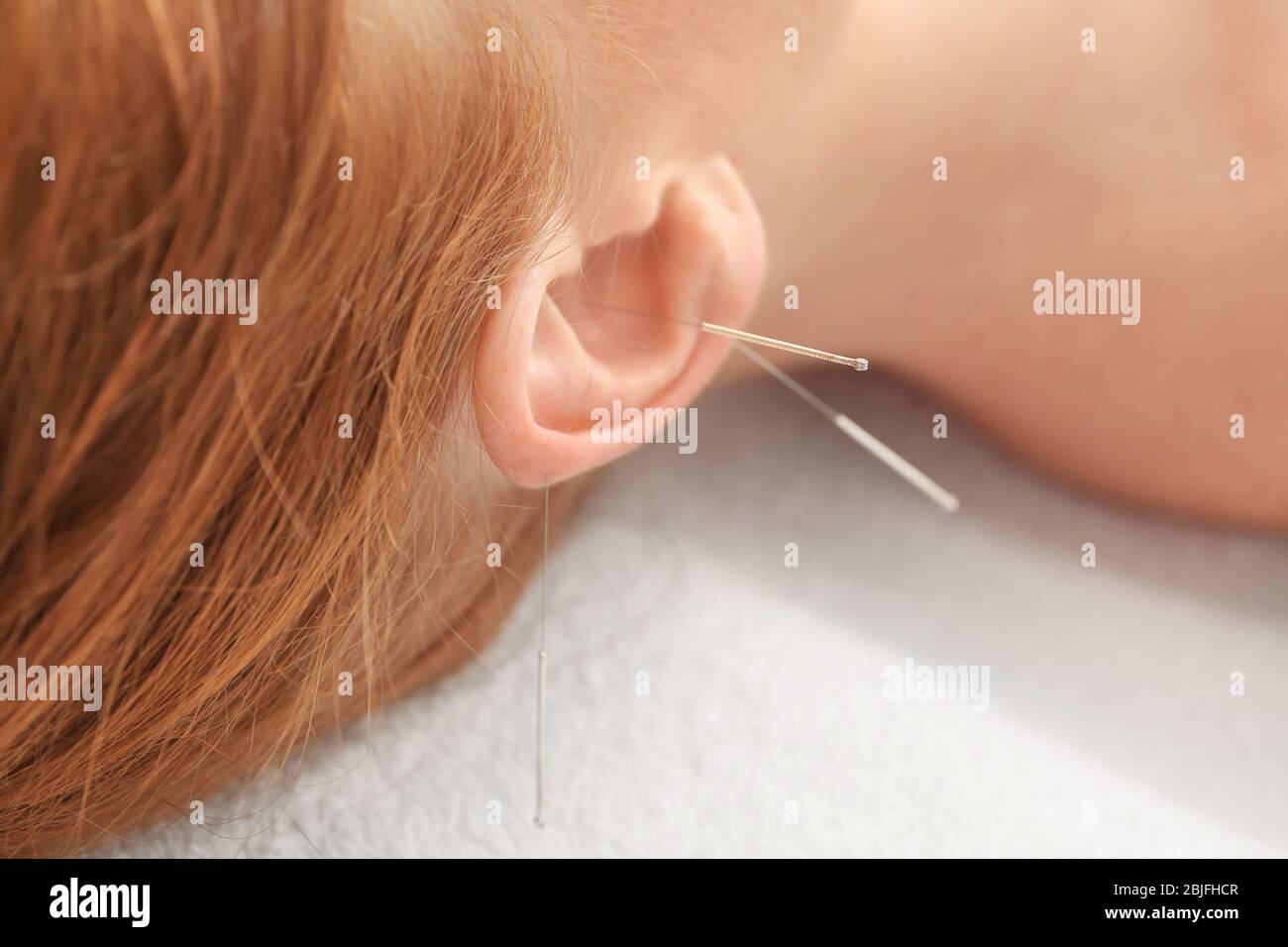 Acupressure ear hi-res stock photography and images - Alamy