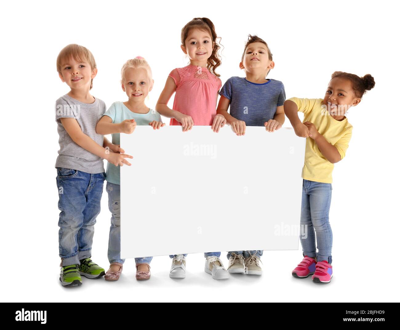 Cute little children with poster on white background Stock Photo - Alamy