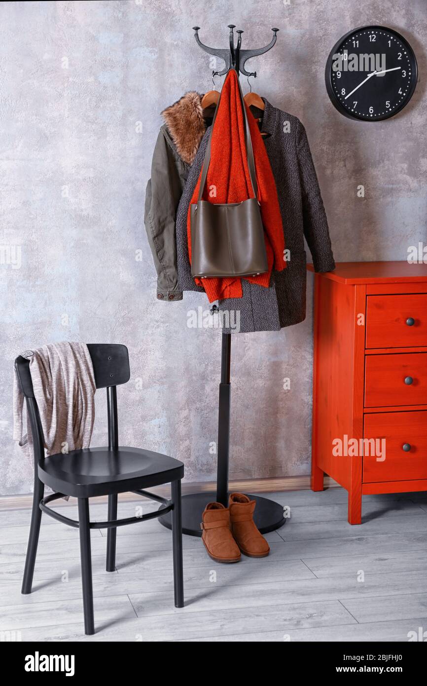 Modern hall interior with hanging clothes Stock Photo - Alamy