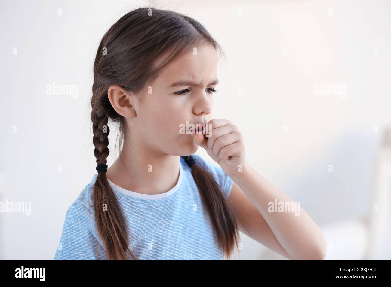 Cute little girl with allergy at home Stock Photo - Alamy
