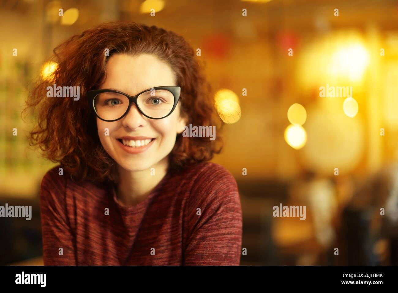 Beautiful girl in cafe Stock Photo - Alamy