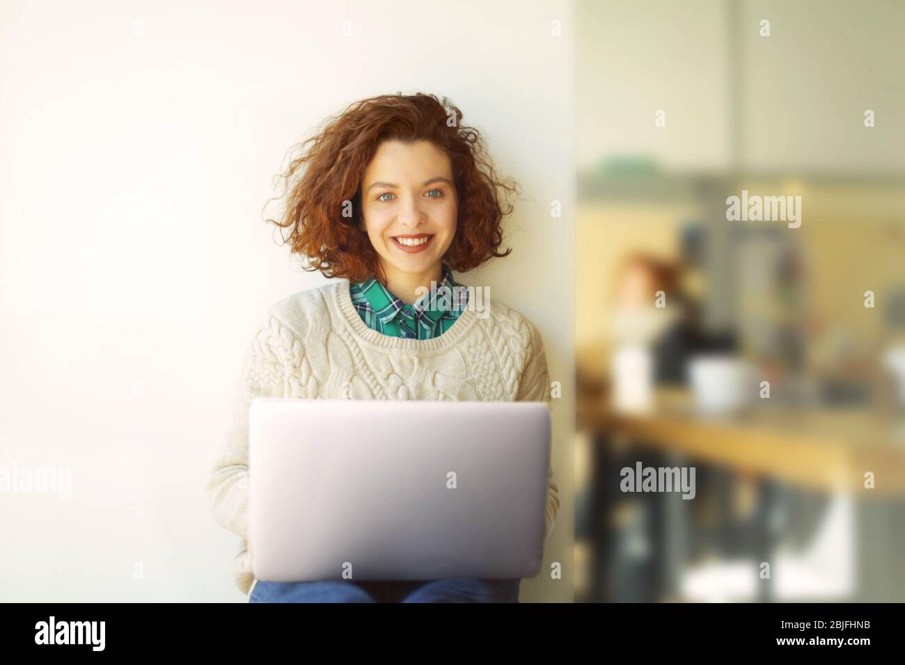 Beautiful girl with laptop in cafe Stock Photo - Alamy