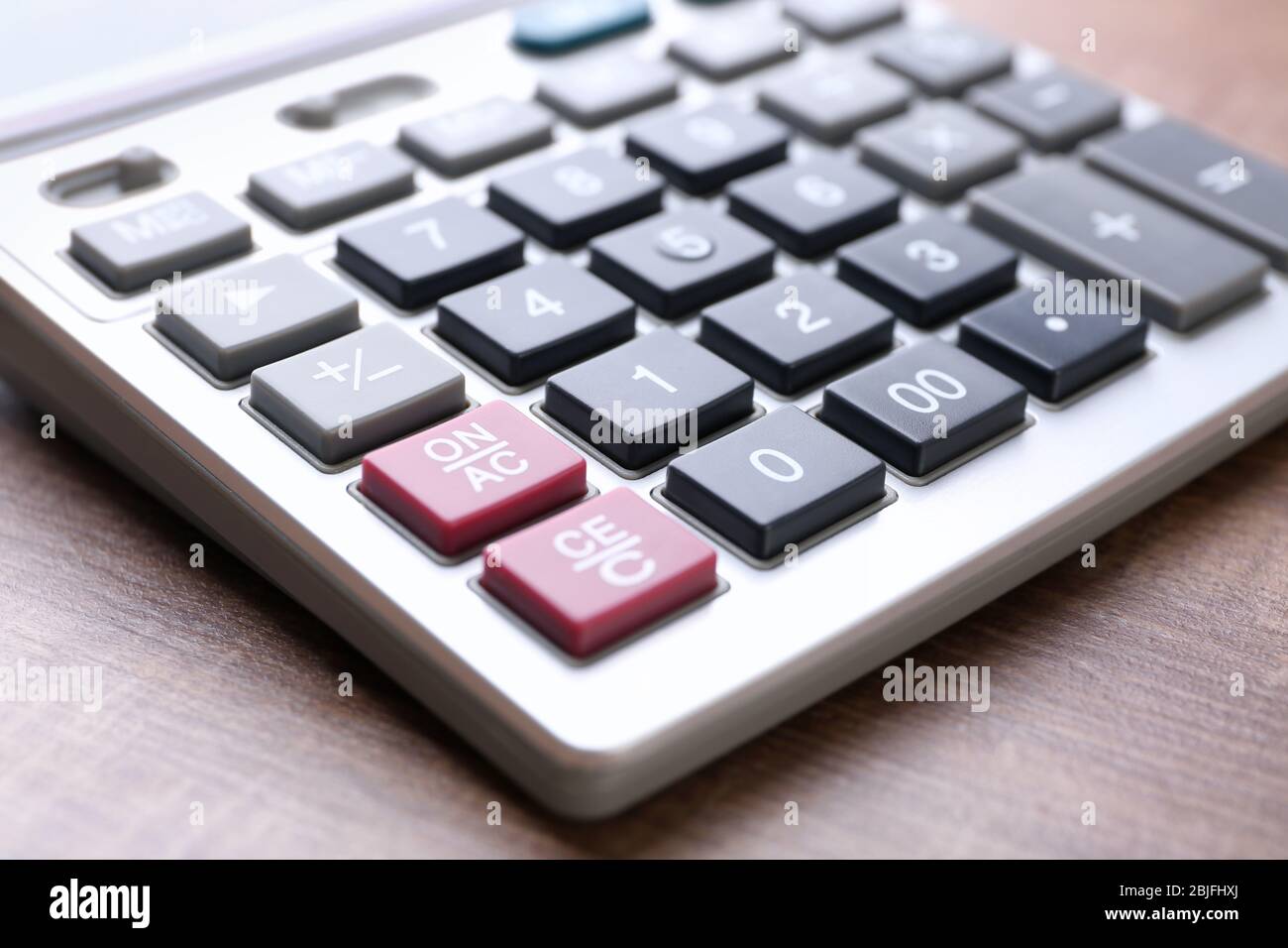 Calculator on table, closeup Stock Photo - Alamy