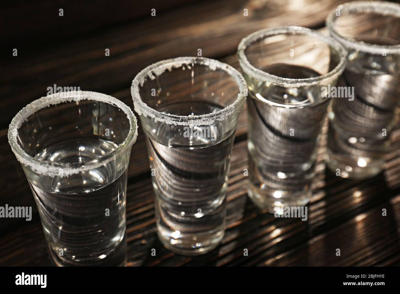 Row of tequila shots hi-res stock photography and images - Alamy