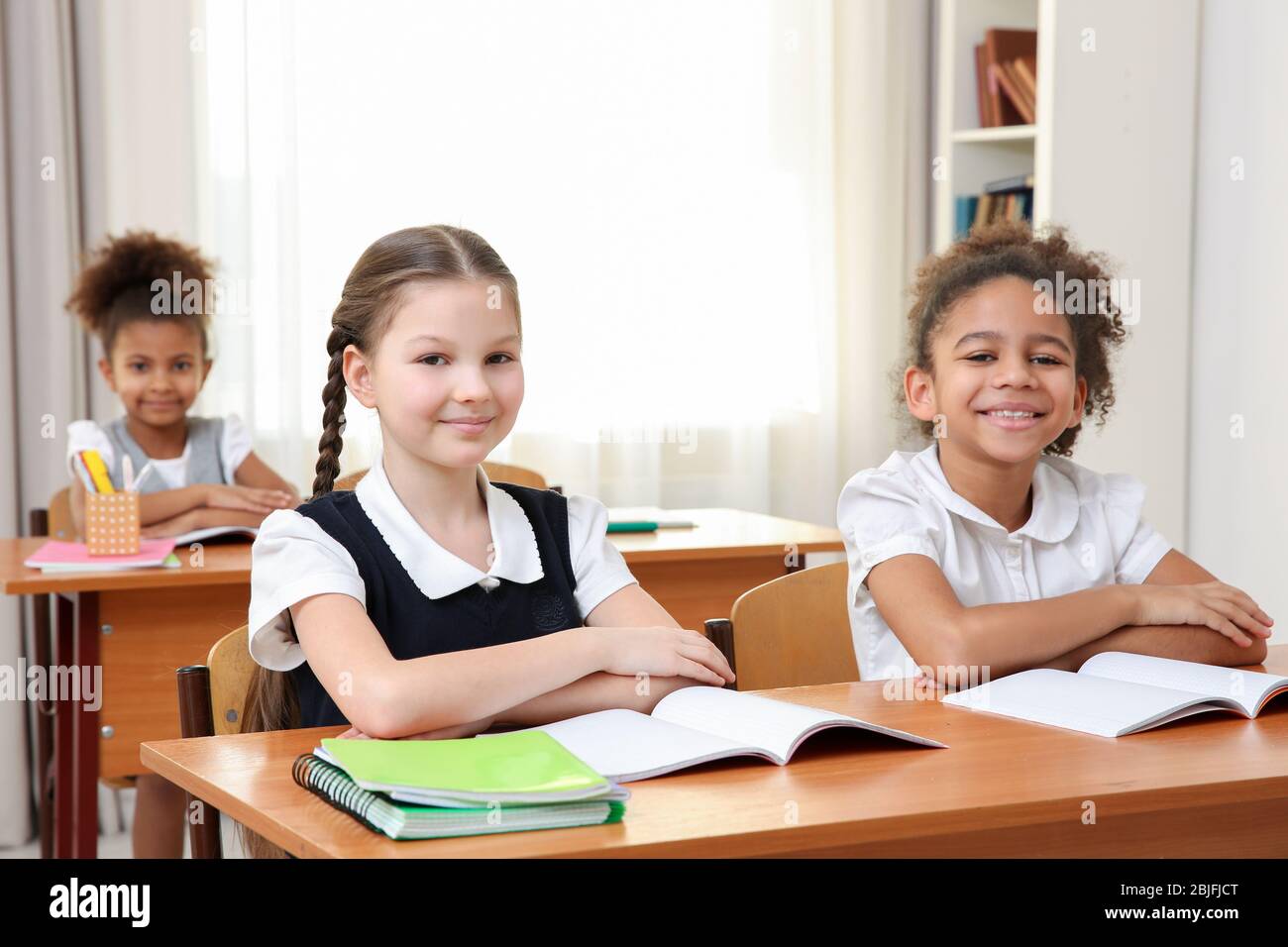 Elementary schoolgirls hi-res stock photography and images - Alamy