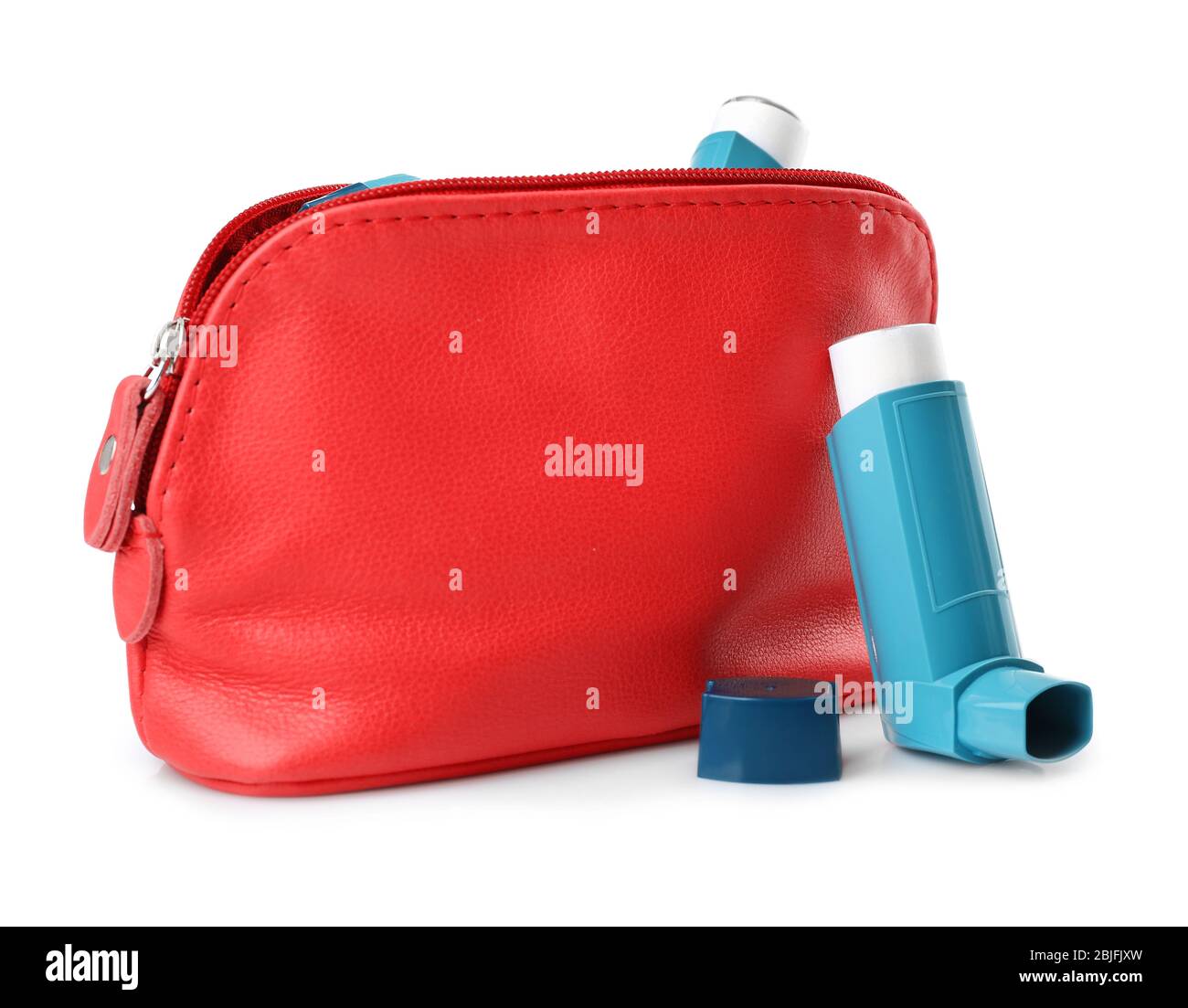 Cosmetic bag with asthma inhalers on white background Stock Photo - Alamy