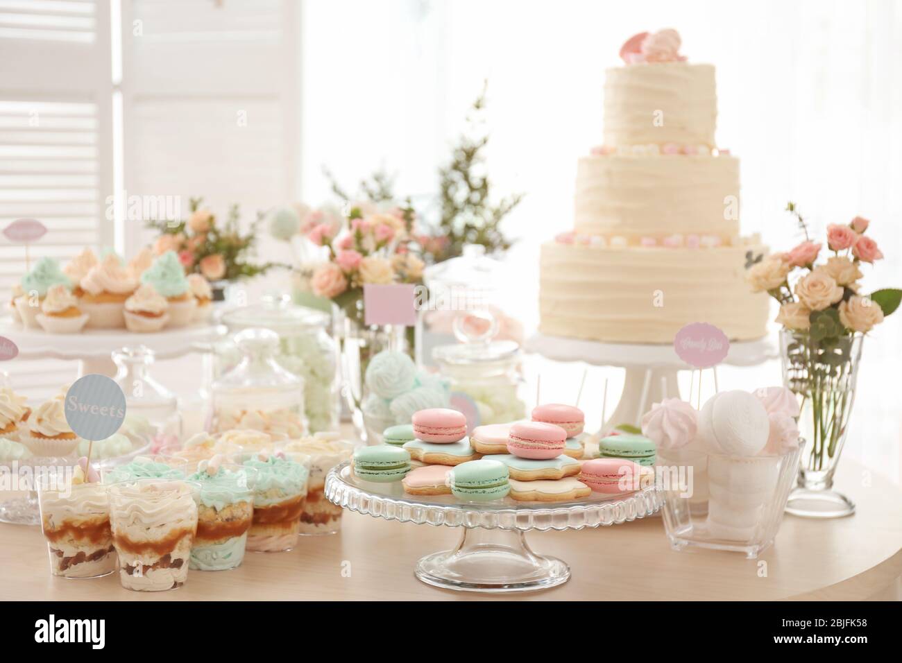Table with sweets prepared for party Stock Photo - Alamy