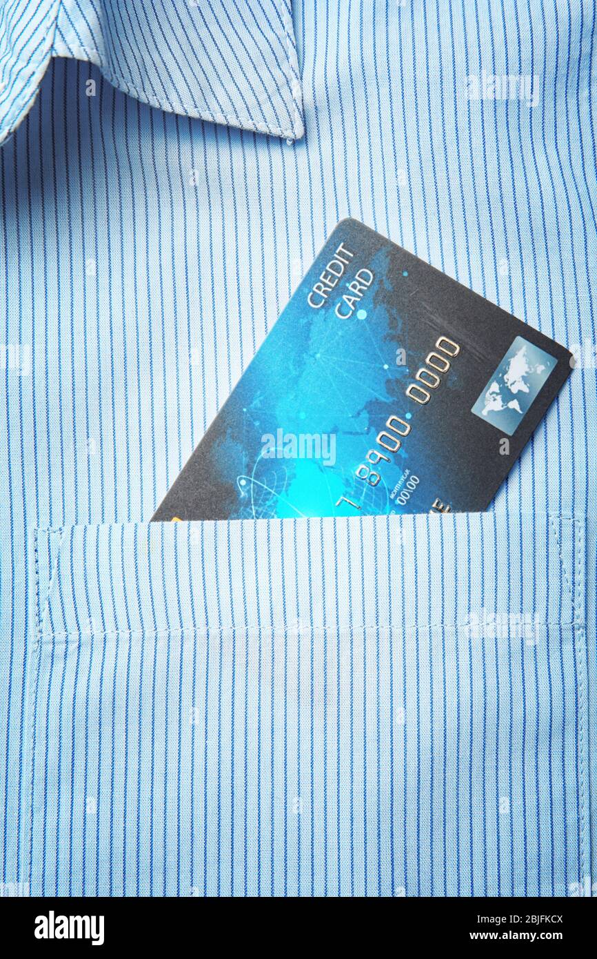 Credit card in shirt pocket, closeup Stock Photo - Alamy