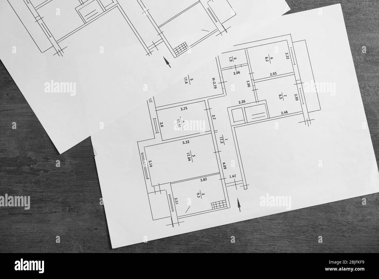 Different blueprints on table Stock Photo - Alamy