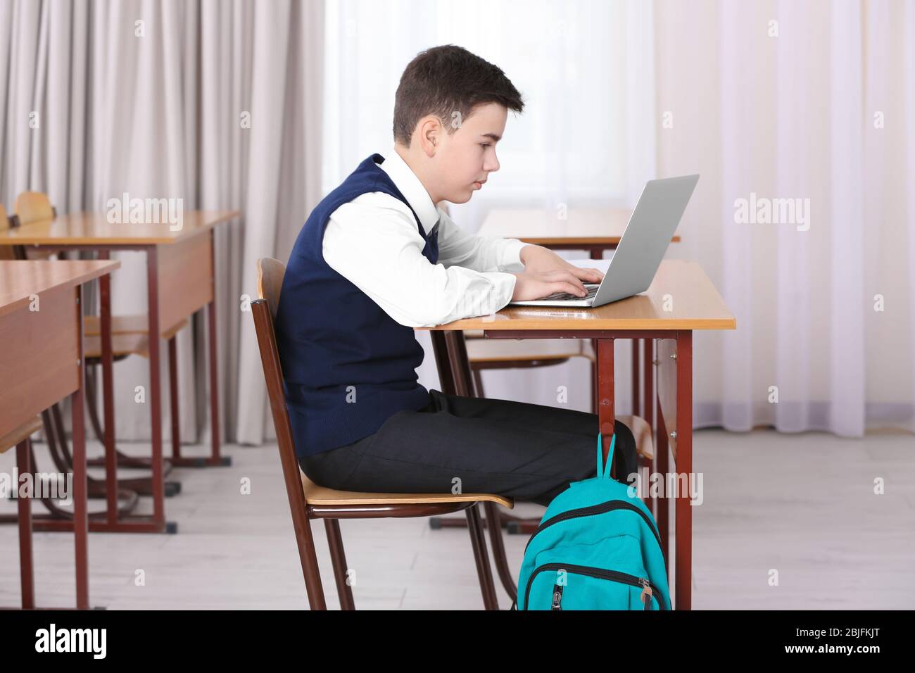 Child computer posture desk hi-res stock photography and images - Alamy