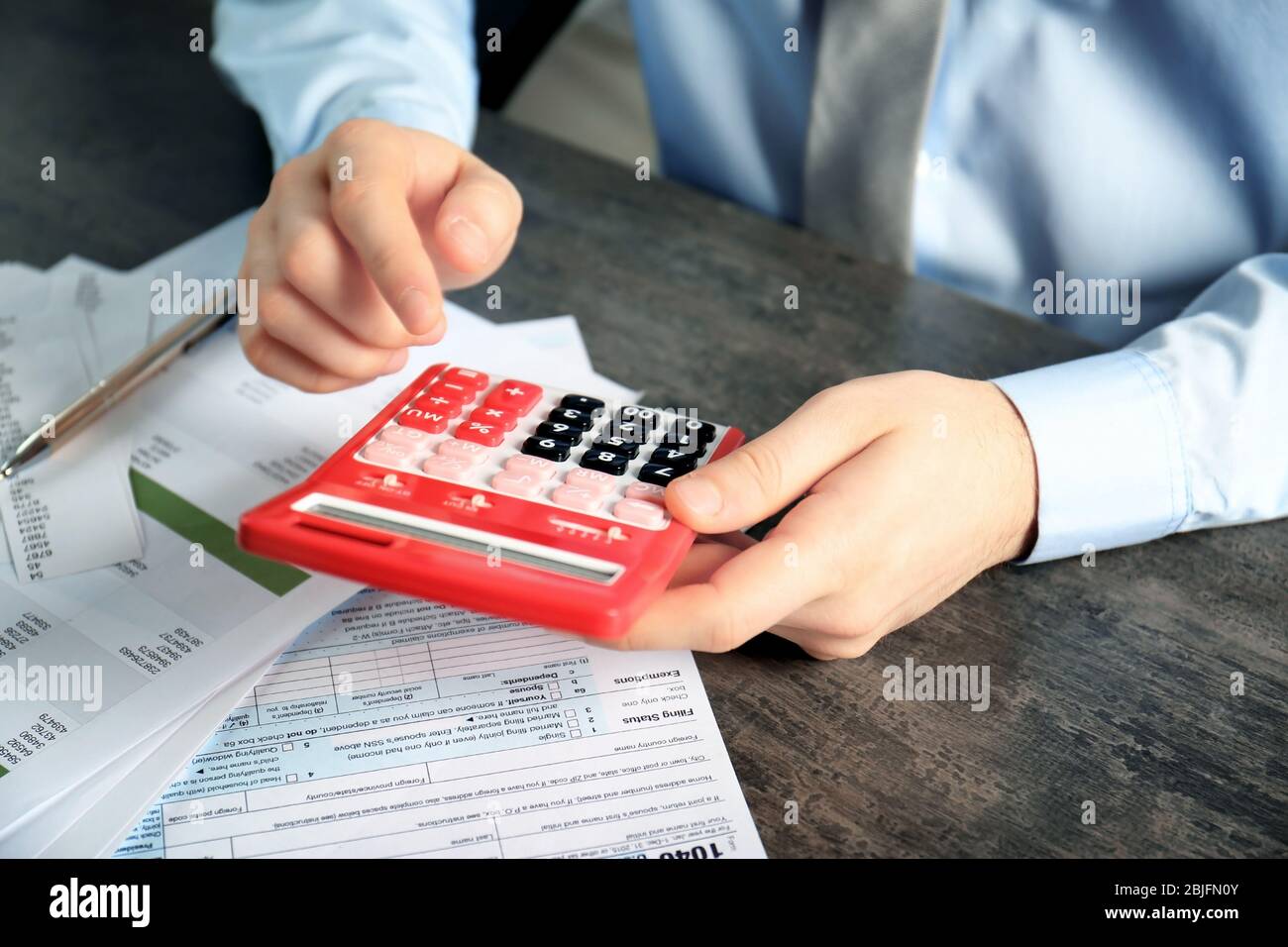 Calculator documents working on hi-res stock photography and images - Alamy