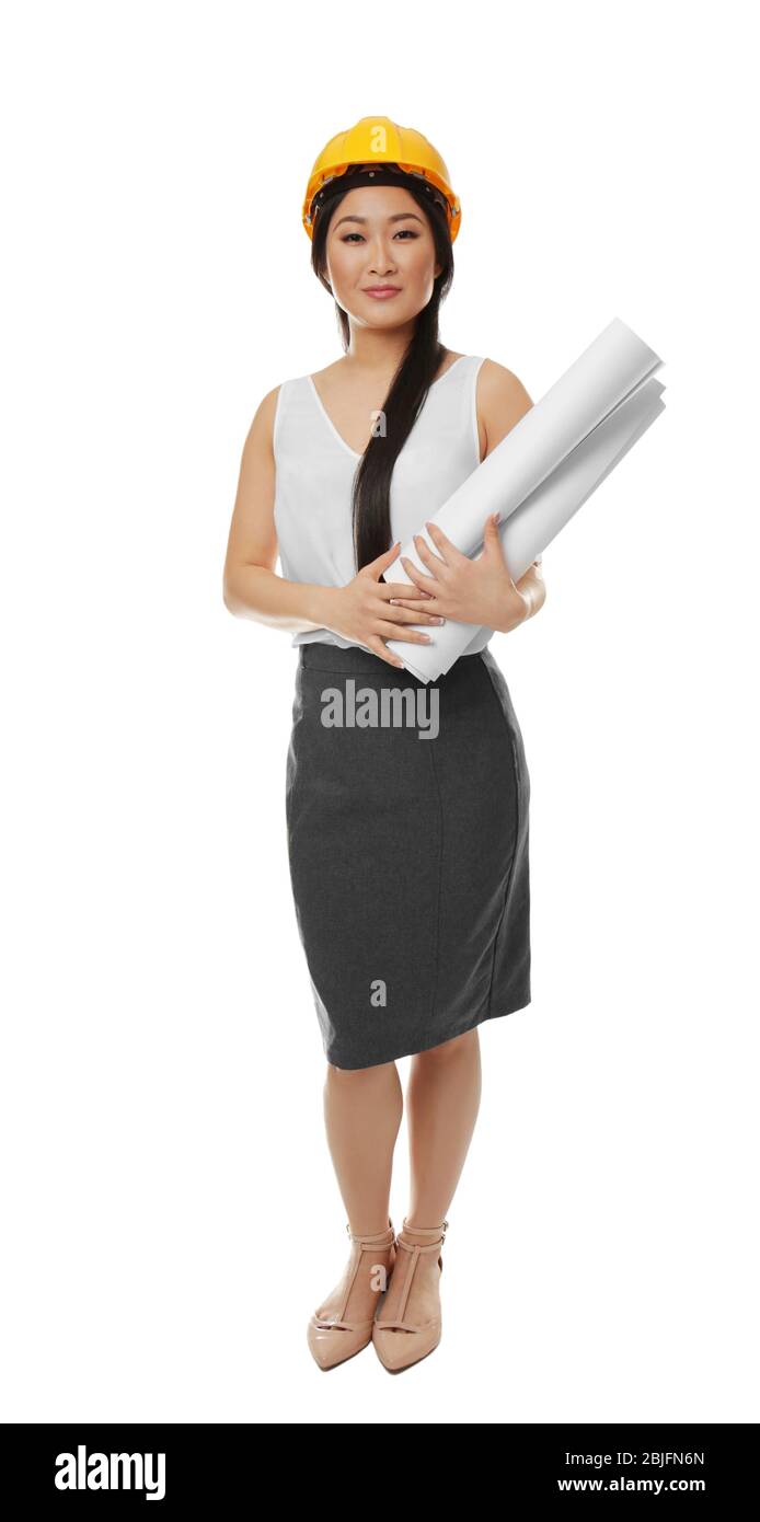 Female engineer standing on white background Stock Photo - Alamy