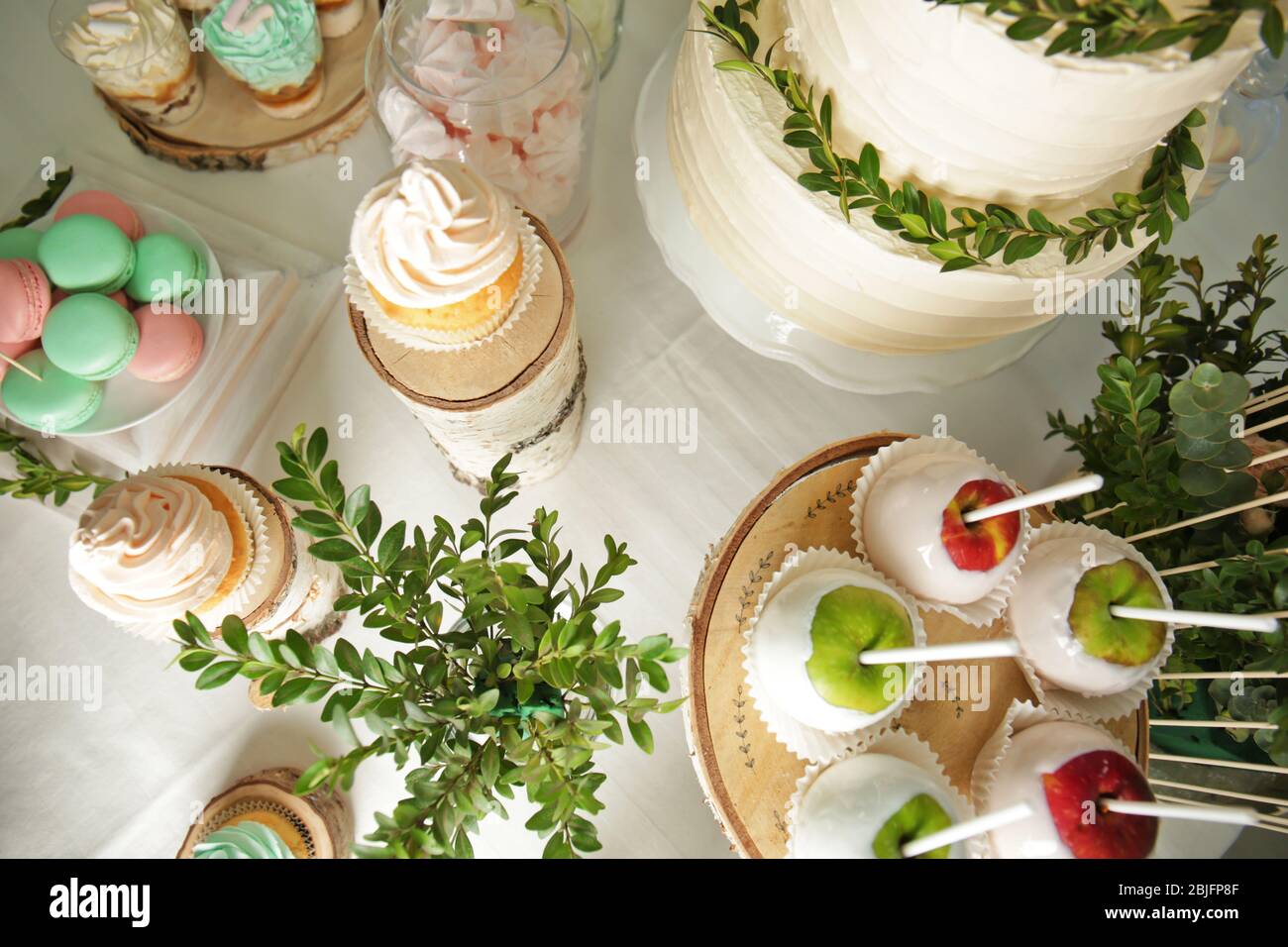 Candy bar. Table with different sweets for party Stock Photo - Alamy