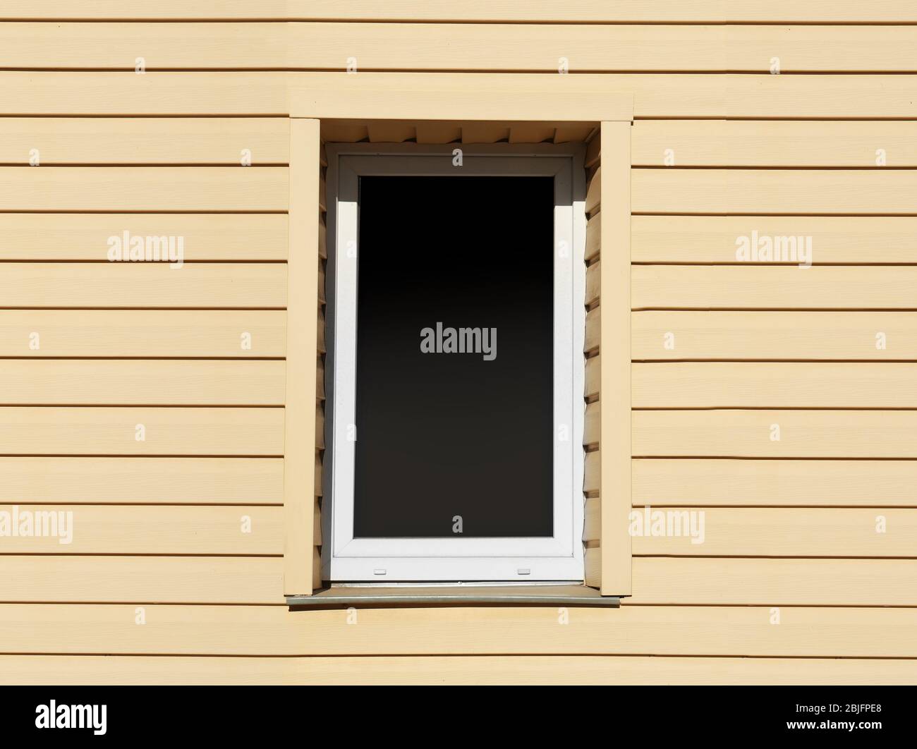 Modern single window on planks wall background Stock Photo - Alamy