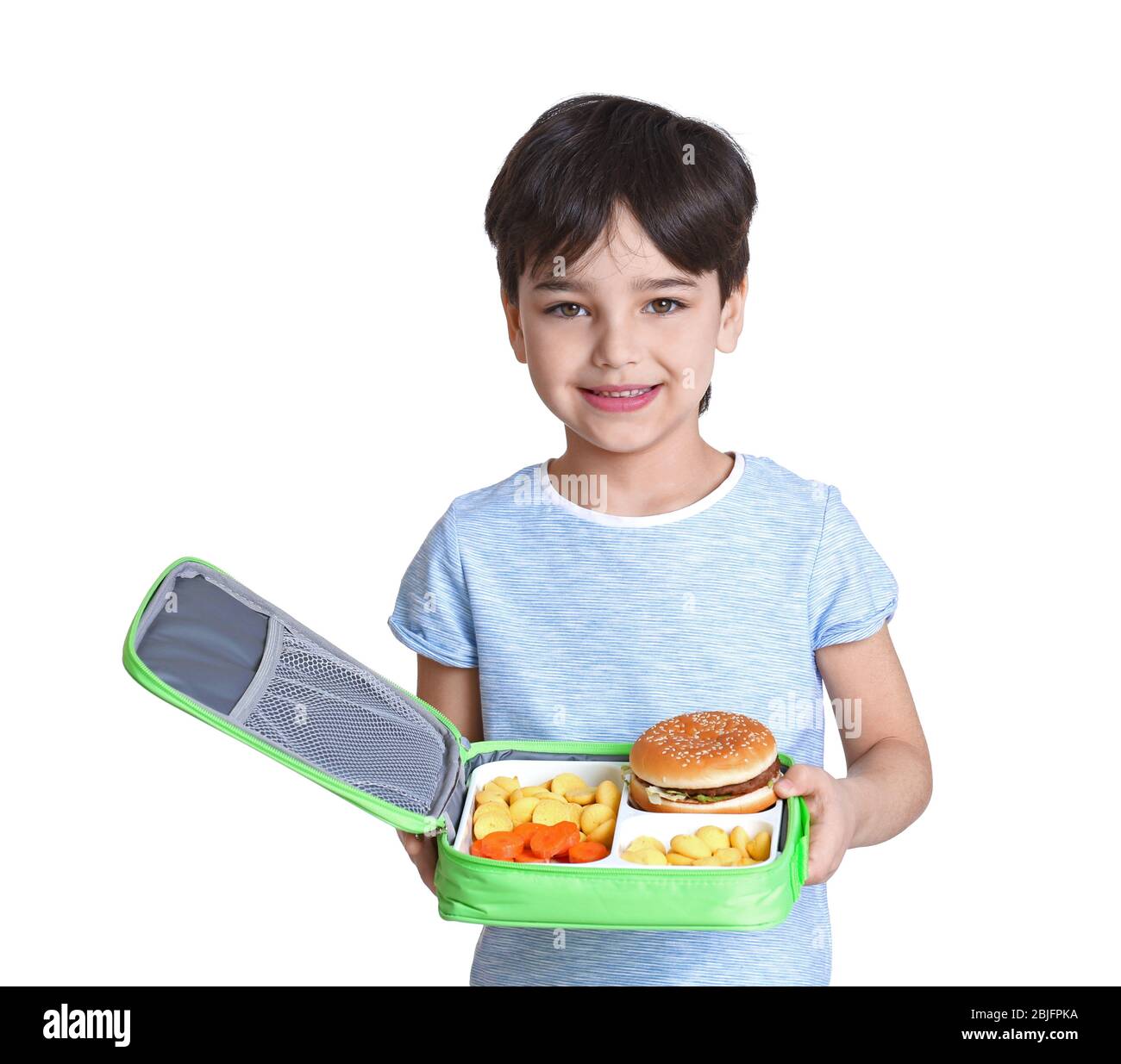 Cute little boy with lunchbox on white background Stock Photo - Alamy