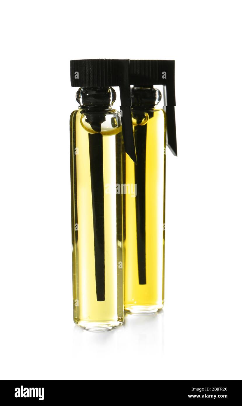 Perfume samples on white background Stock Photo - Alamy
