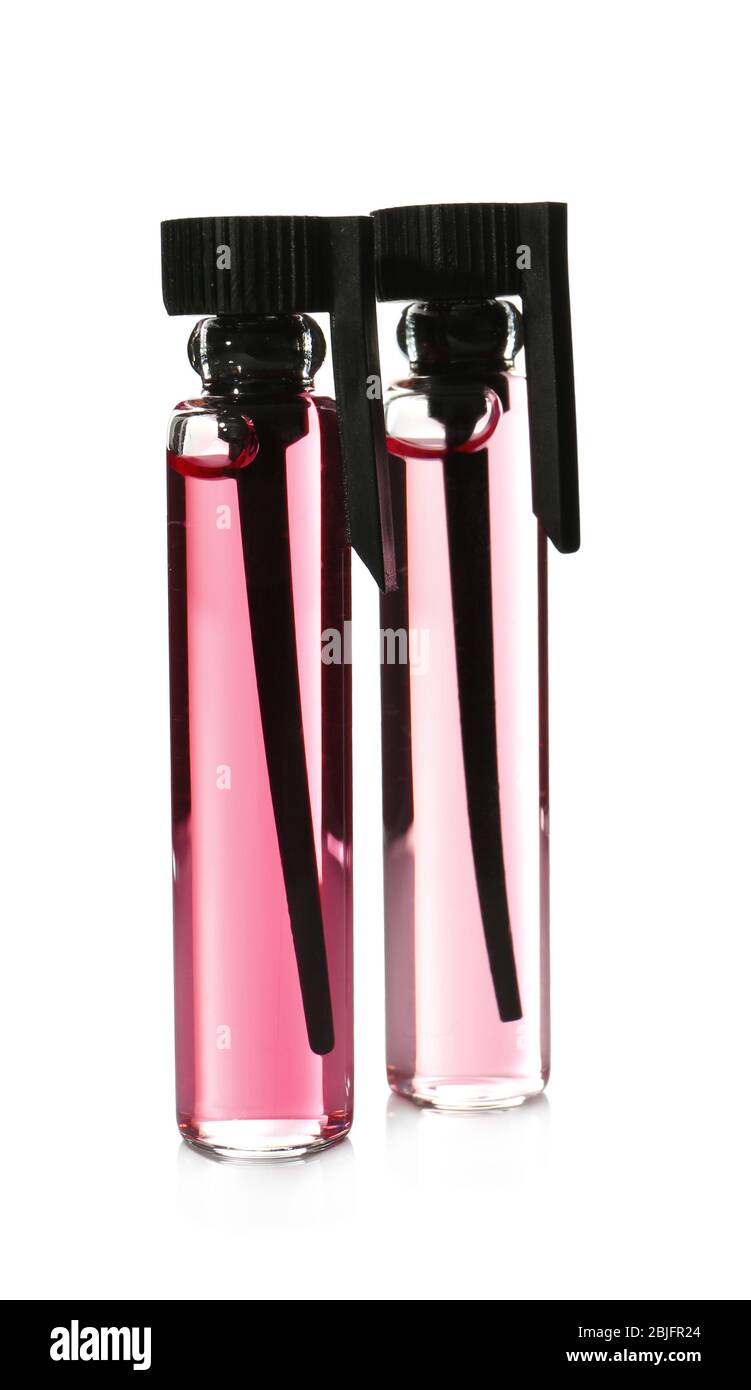 Perfume samples on white background Stock Photo - Alamy