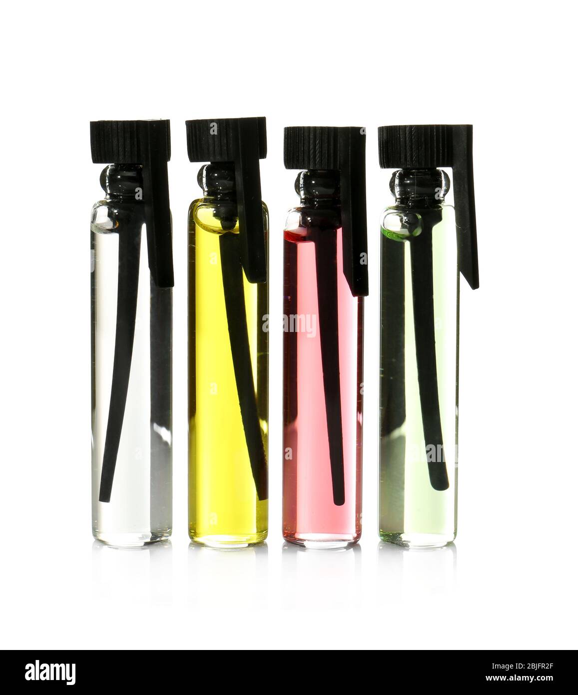 Perfume samples on white background Stock Photo - Alamy