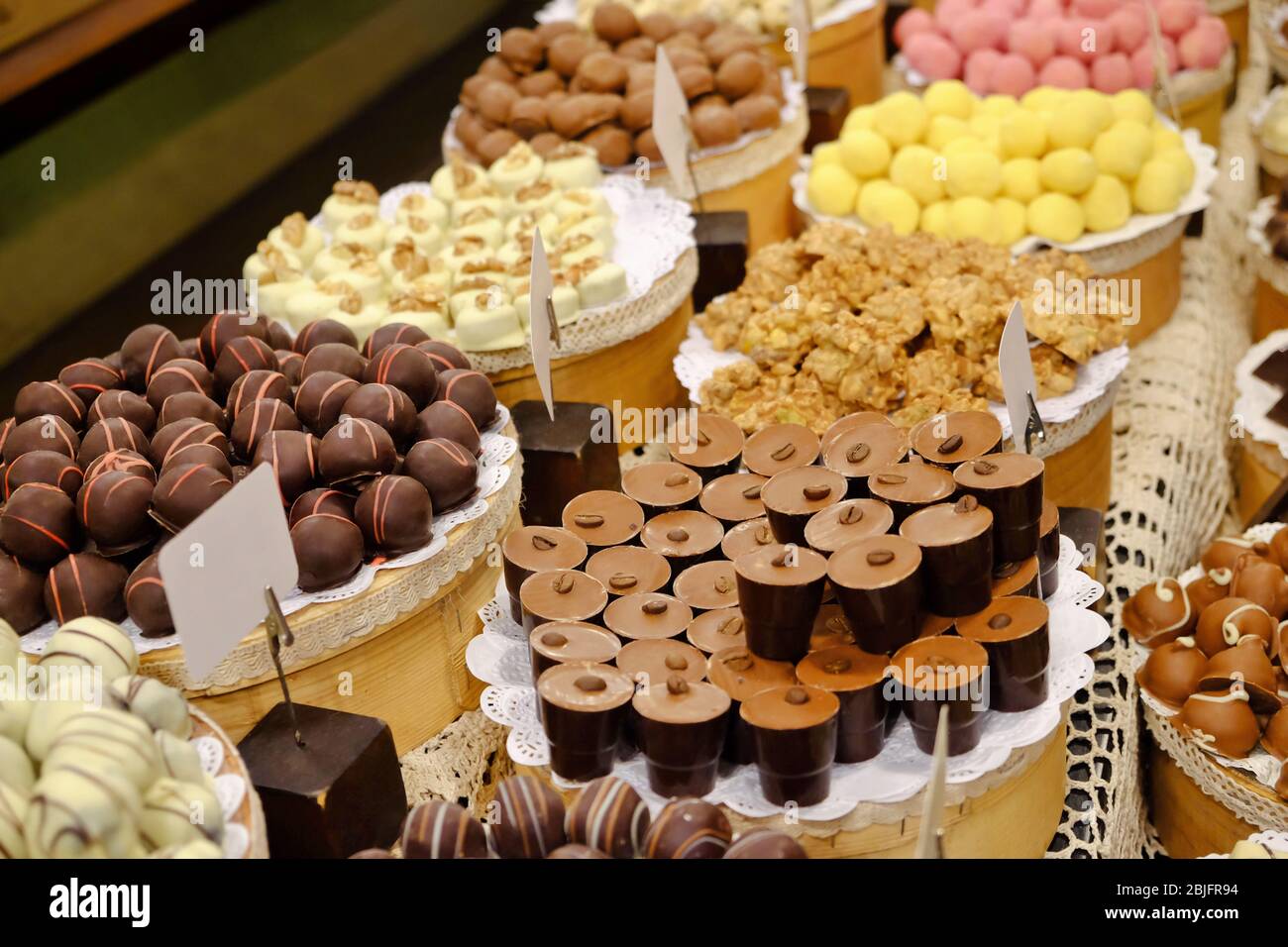 Various tasty sweets in candy shop Stock Photo - Alamy