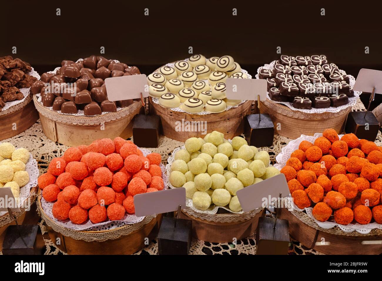 Various tasty sweets in candy shop Stock Photo - Alamy