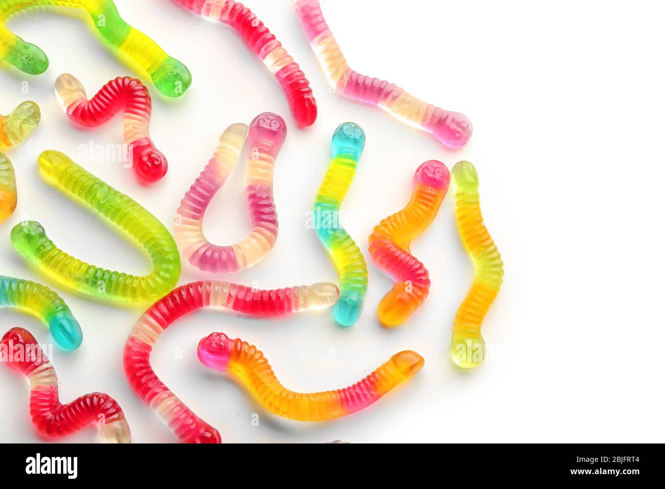 Tasty jelly worms on white background Stock Photo - Alamy