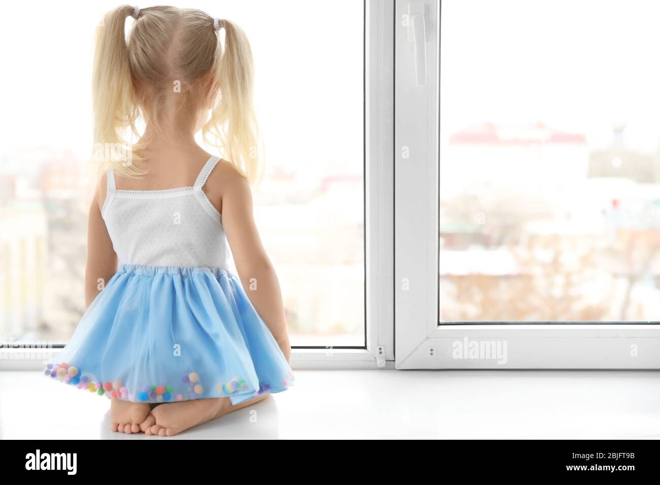 Feet on windowsill hi-res stock photography and images - Alamy