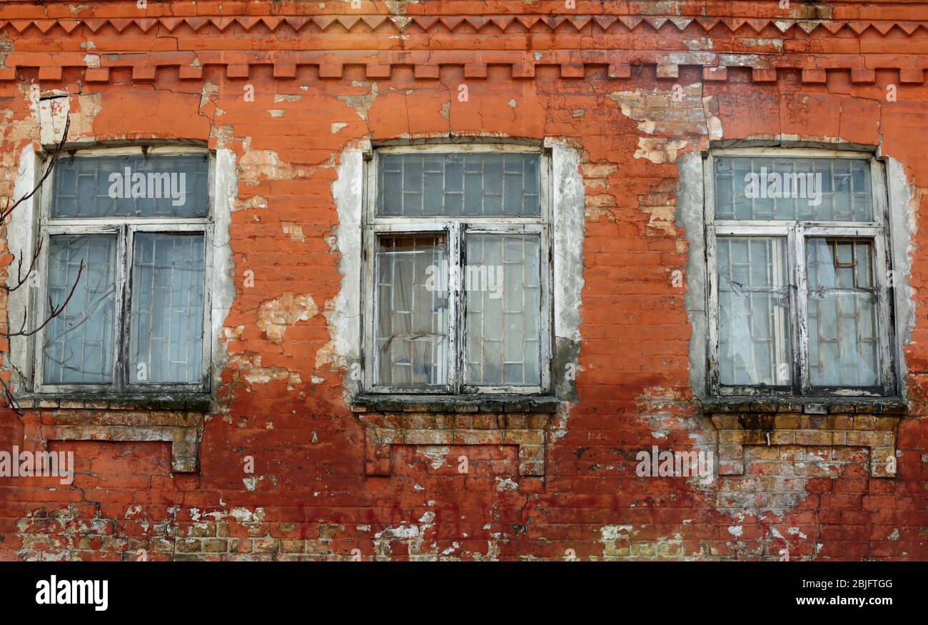 Old brick building with wooden windows Stock Photo - Alamy