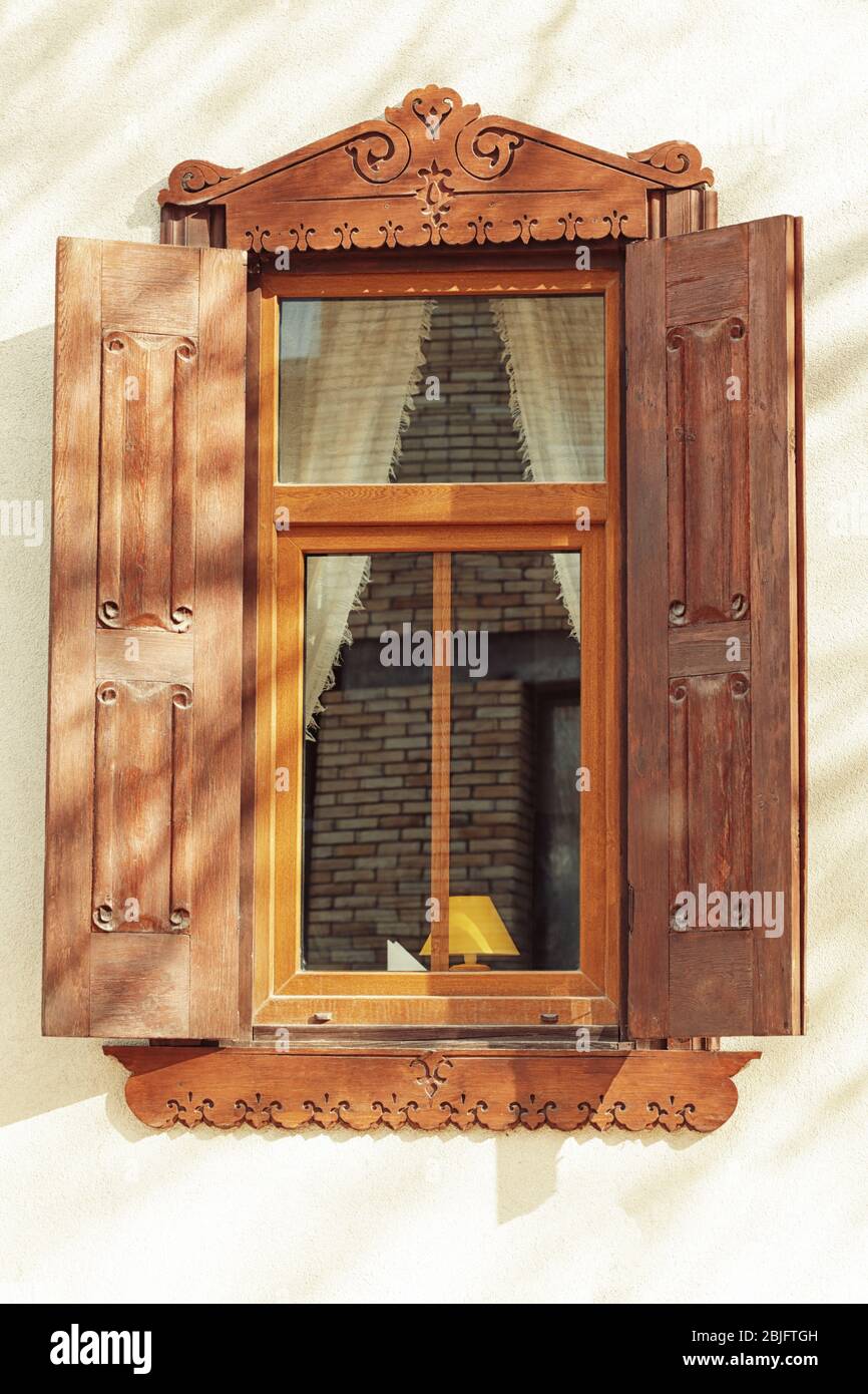 Vintage window with sand wall background Stock Photo - Alamy