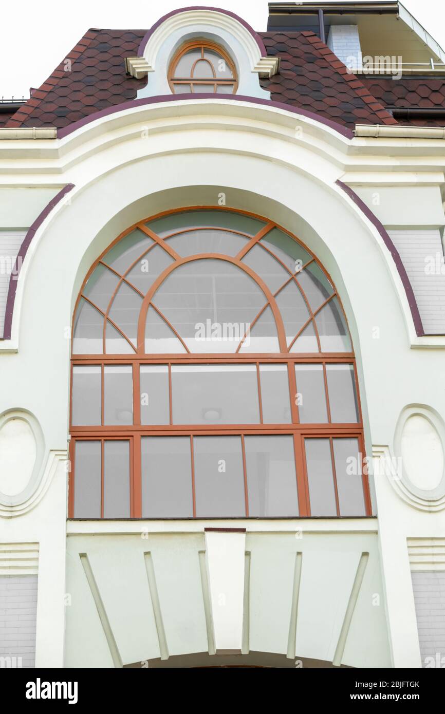 Vintage building with arched windows Stock Photo - Alamy