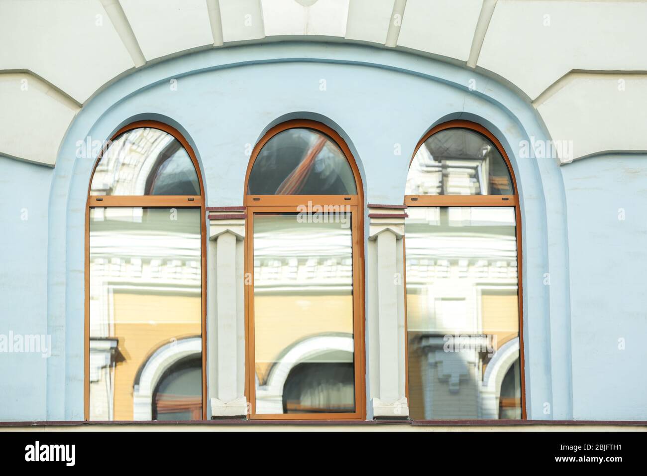 Vintage building with arched windows Stock Photo - Alamy