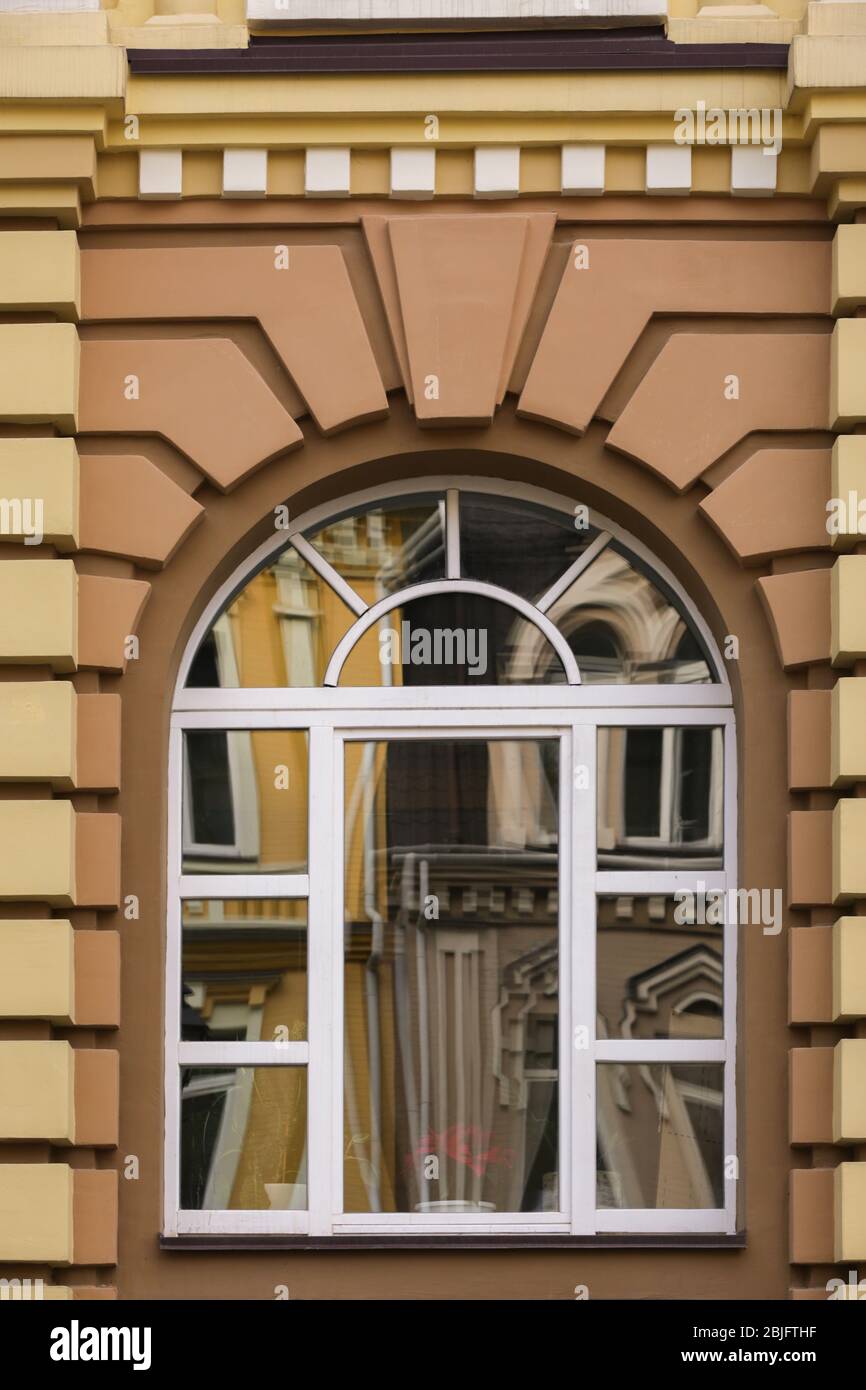 Arched window with decorated wall background Stock Photo - Alamy