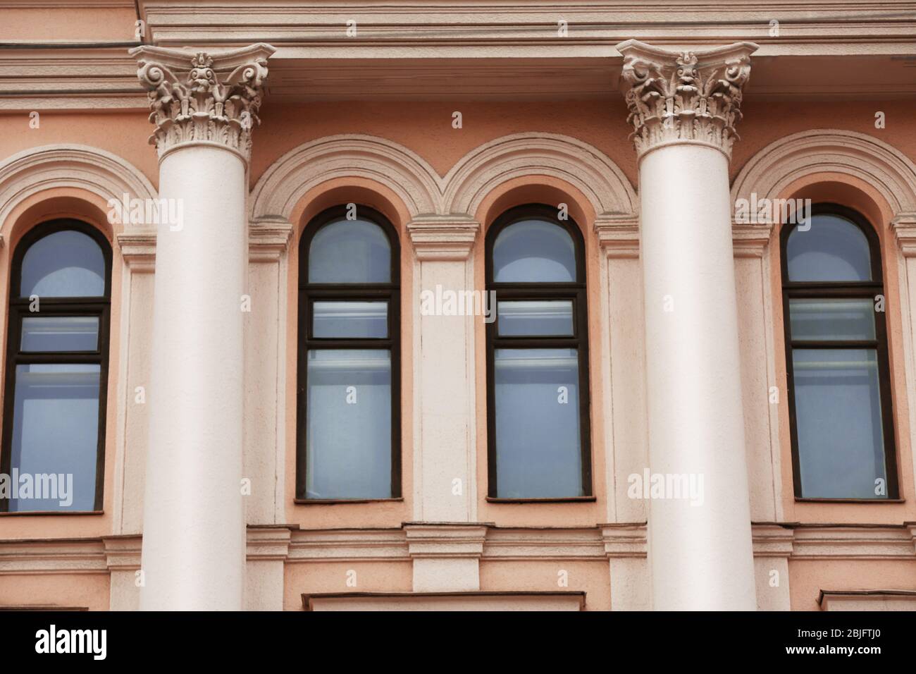 Arched windows with decorated wall background Stock Photo - Alamy