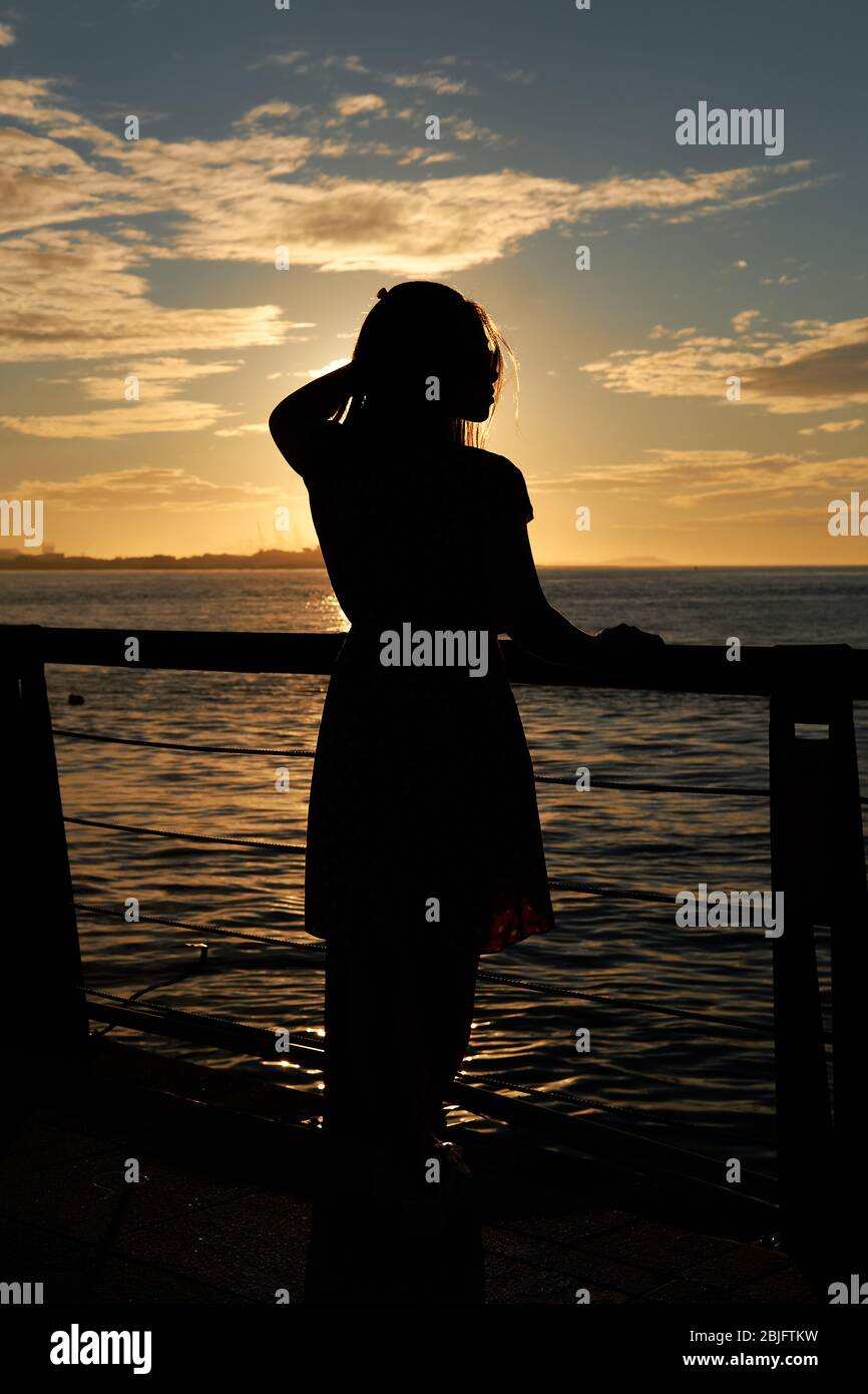 Full length backlit girl silhouette hi-res stock photography and images ...