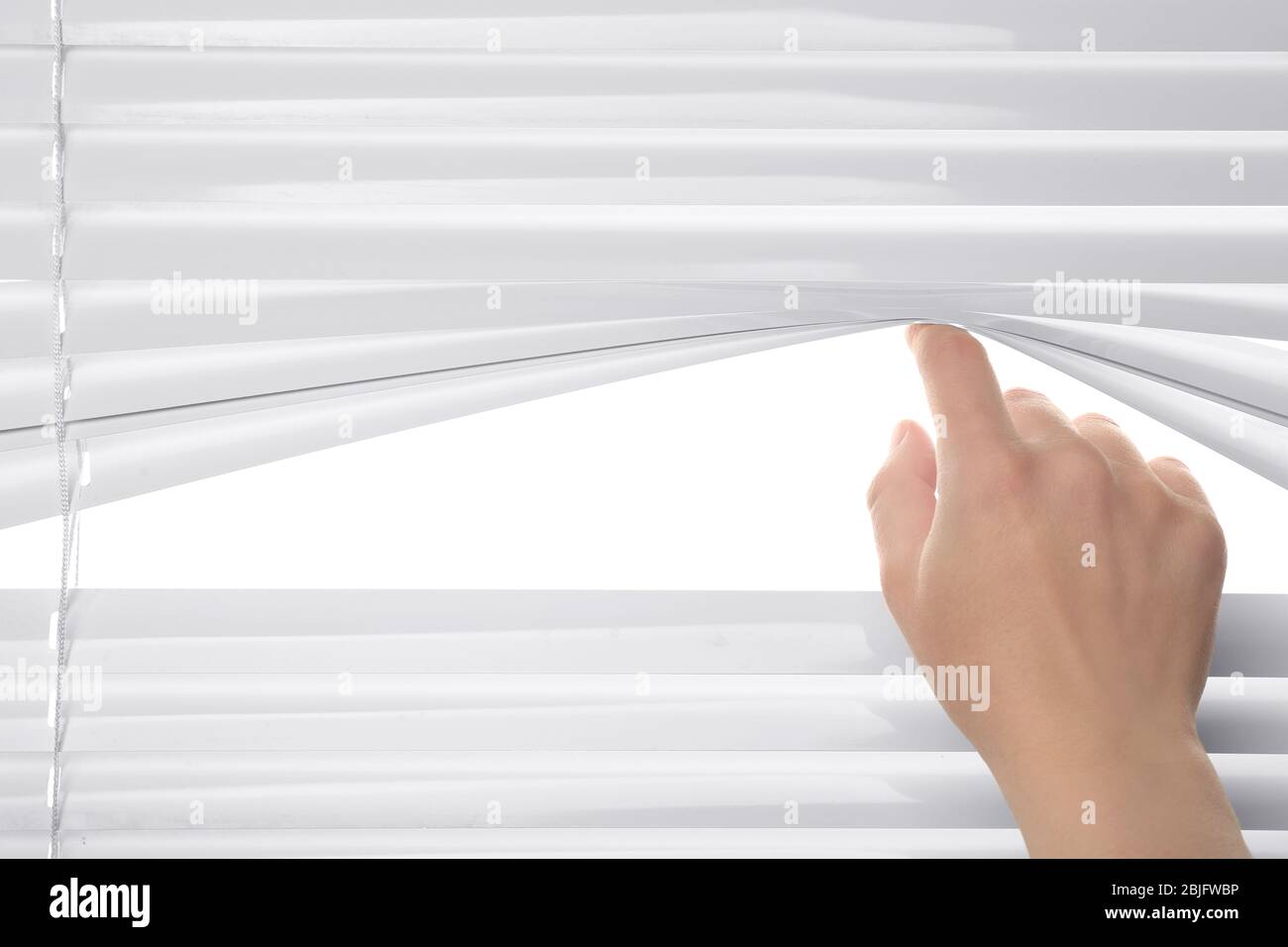Human hand opening blinds Stock Photo - Alamy