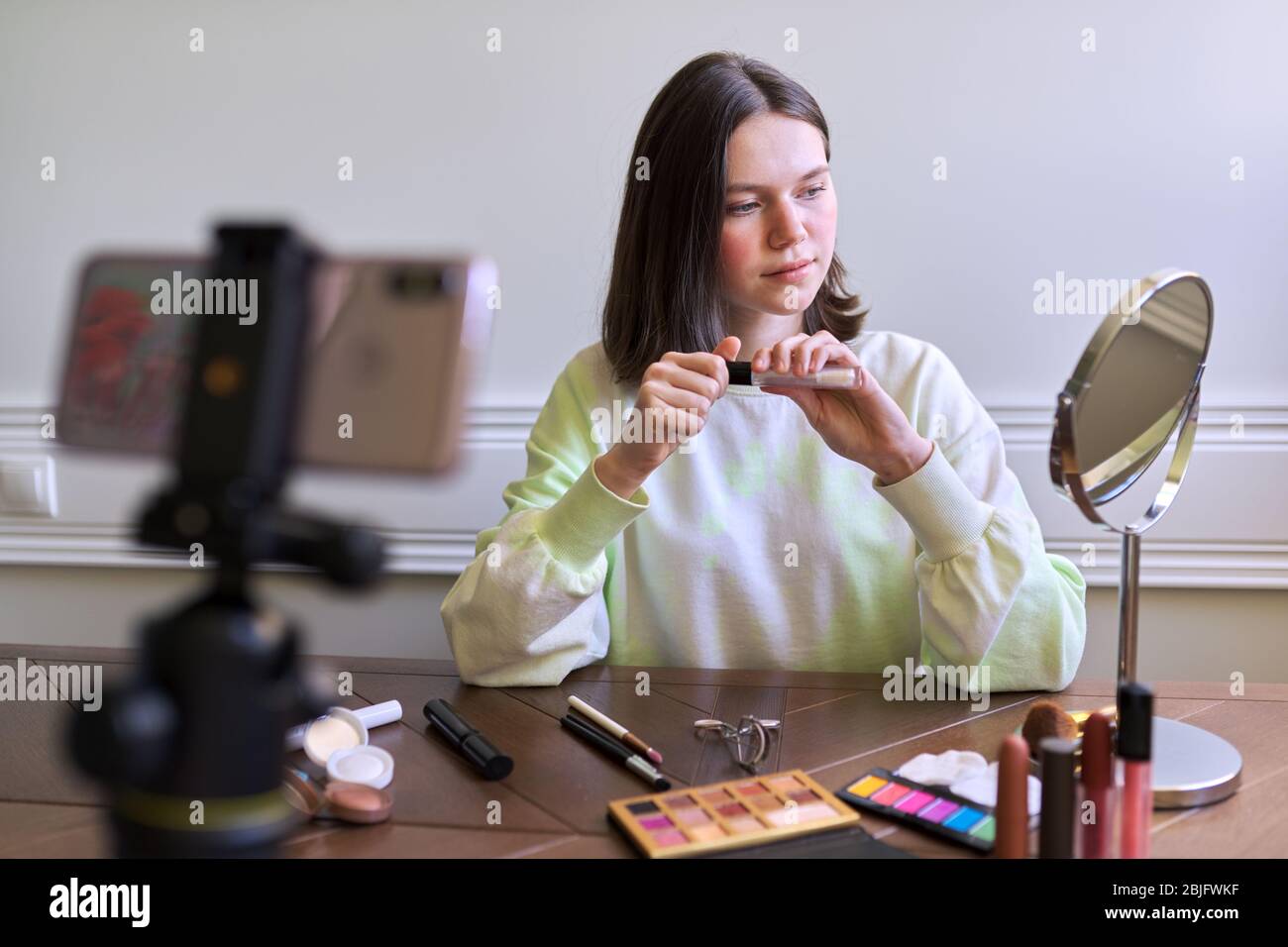 Teenage girl, beauty blogger filming video for her channel, blog ...