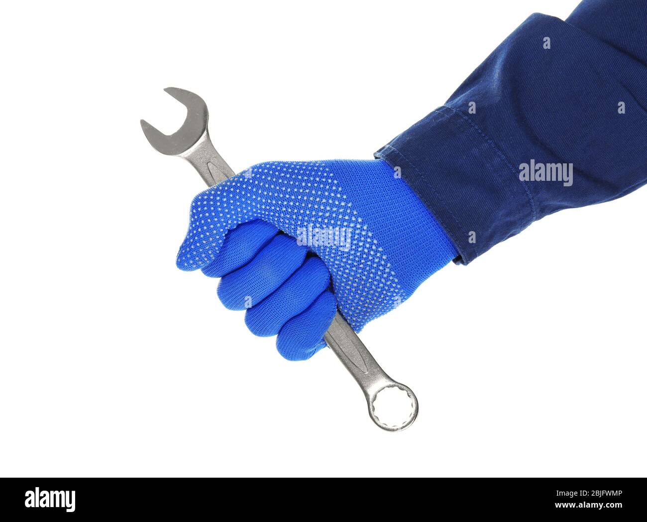 Hand of auto mechanic with wrench on white background Stock Photo - Alamy