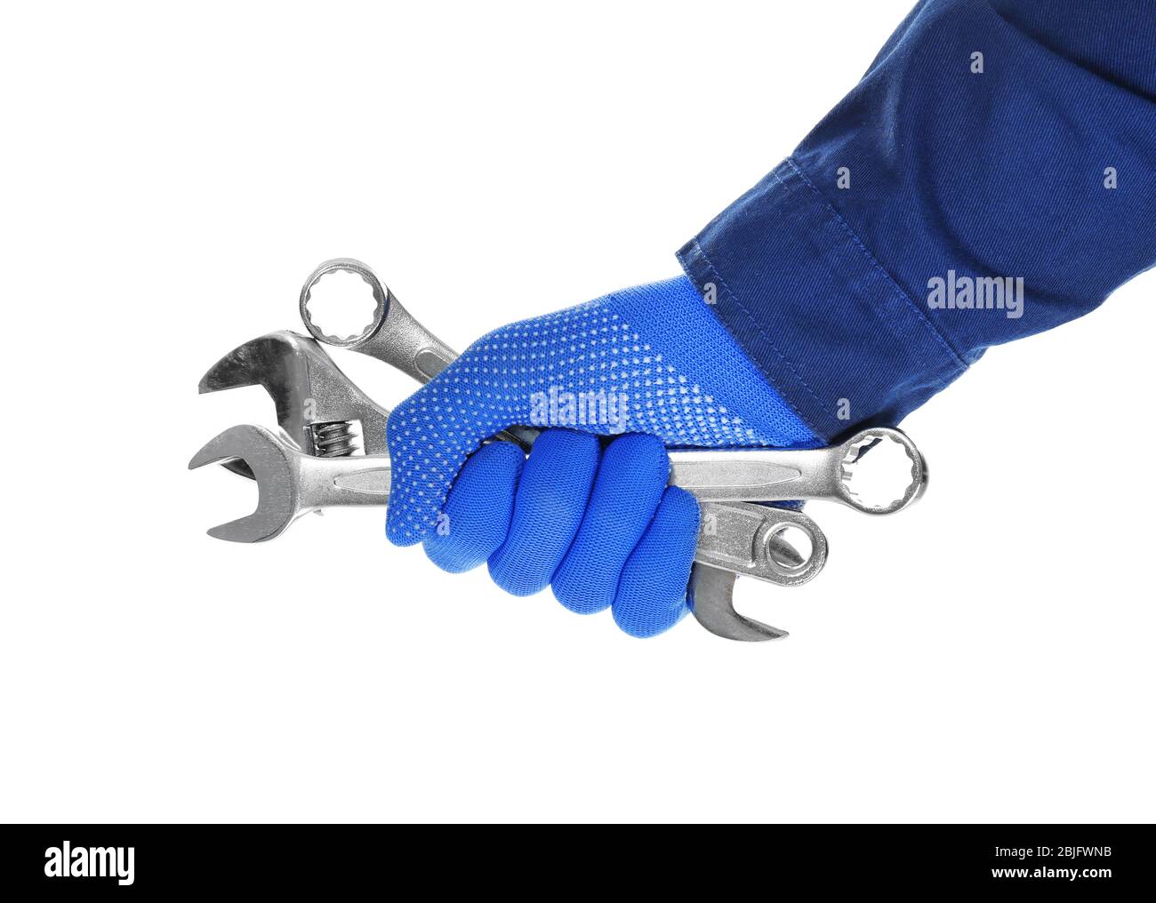 Hand of auto mechanic with tools on white background Stock Photo - Alamy