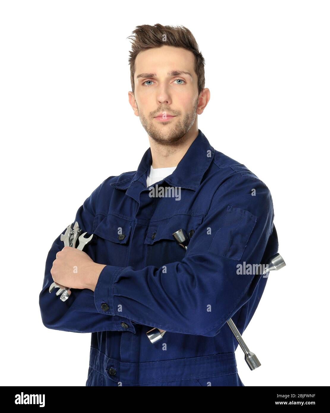Handsome auto mechanic on white background Stock Photo - Alamy