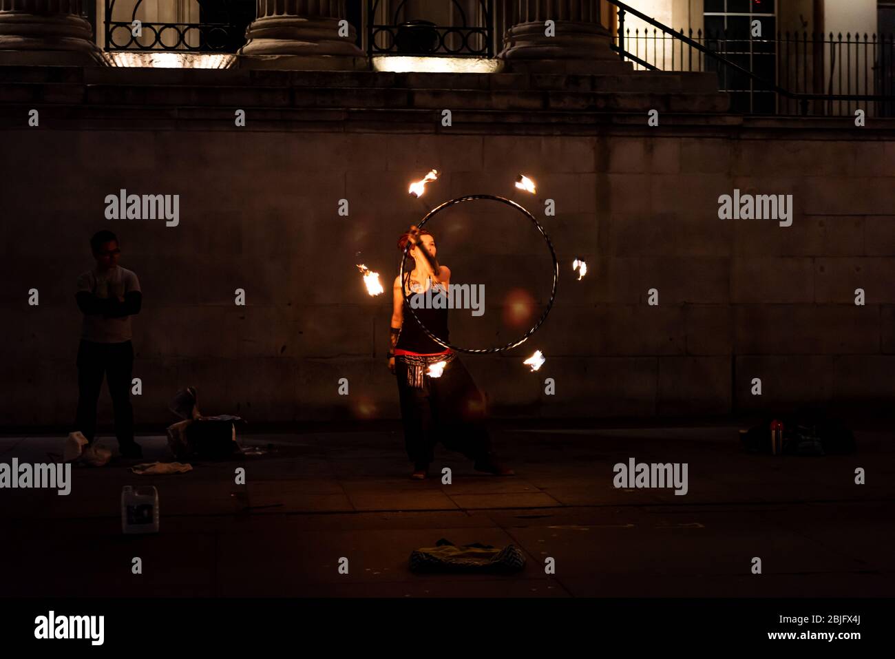 spectacular night time entertainment at Trafalgar Square with a street ...