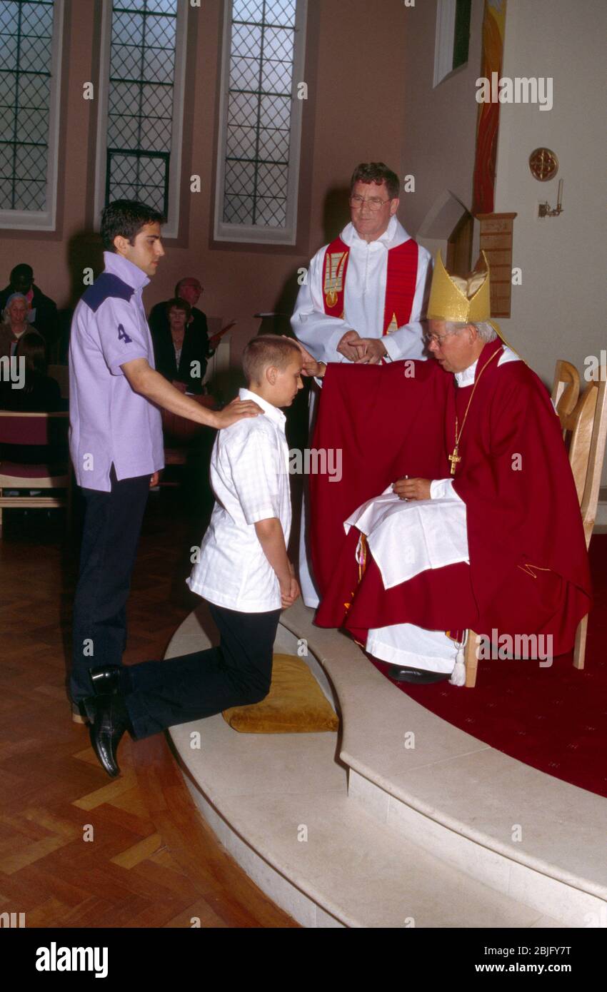 Confirmation At Pentecost Bishop Annointing Candidate at St Joseph's ...