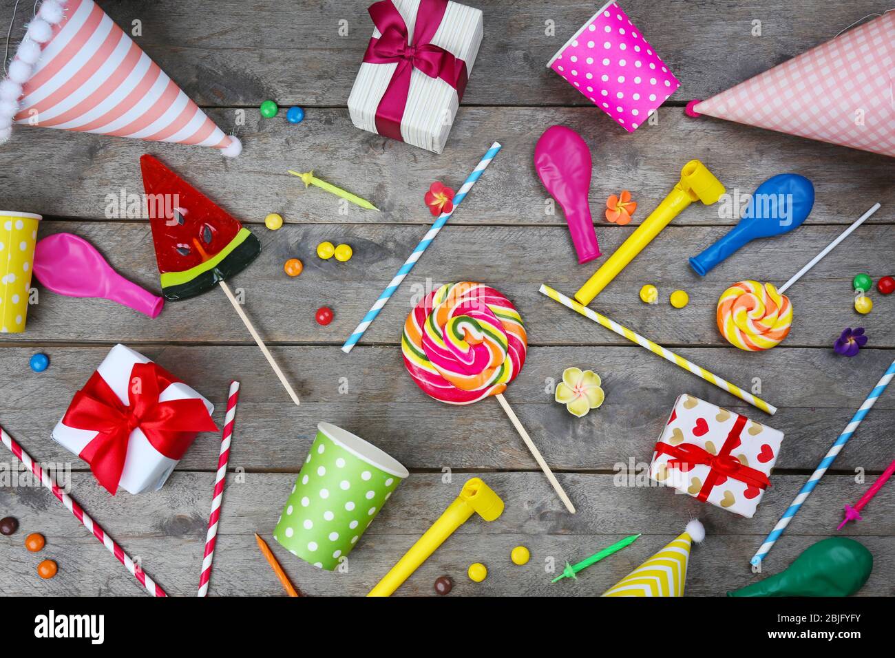 Bright birthday background with sweets and decorations Stock Photo - Alamy